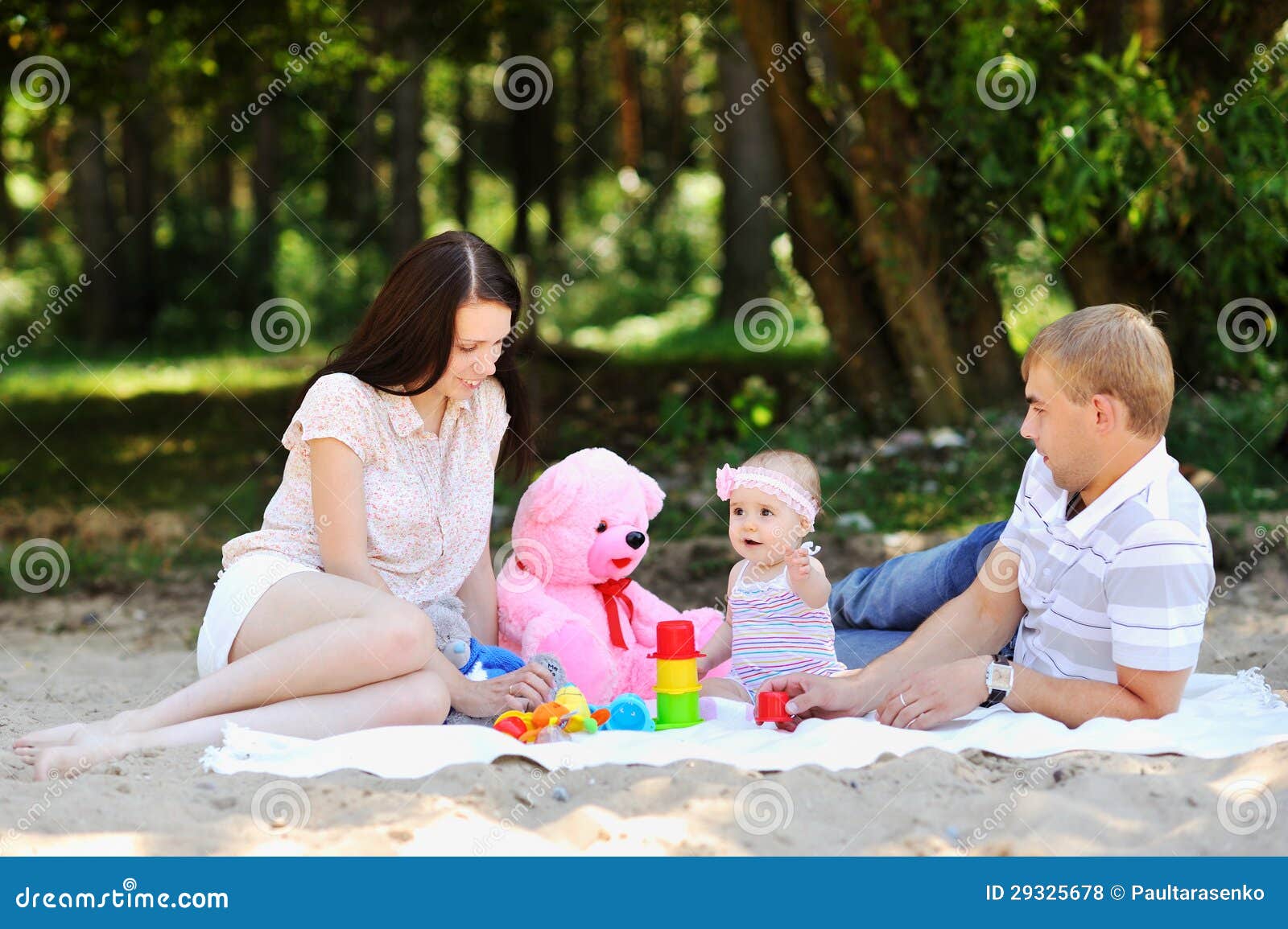 Happy family in a park stock photo. Image of caucasian - 29325678