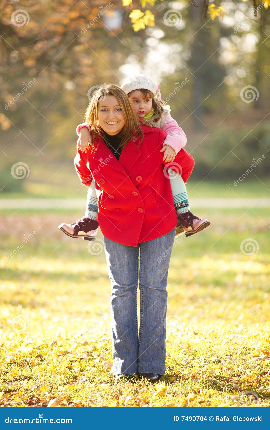 Happy family in park stock photo. Image of autumn, fall - 7490704
