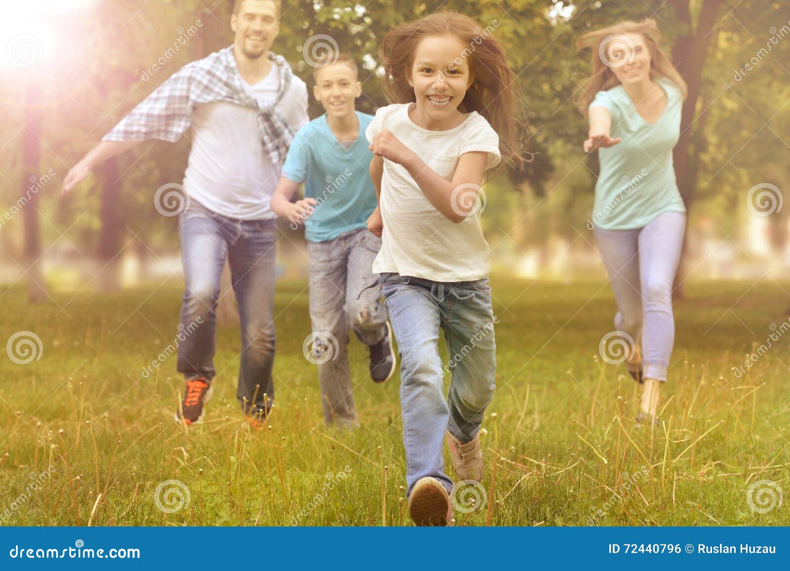 Happy family in park stock photo. Image of playing, expression - 72440796