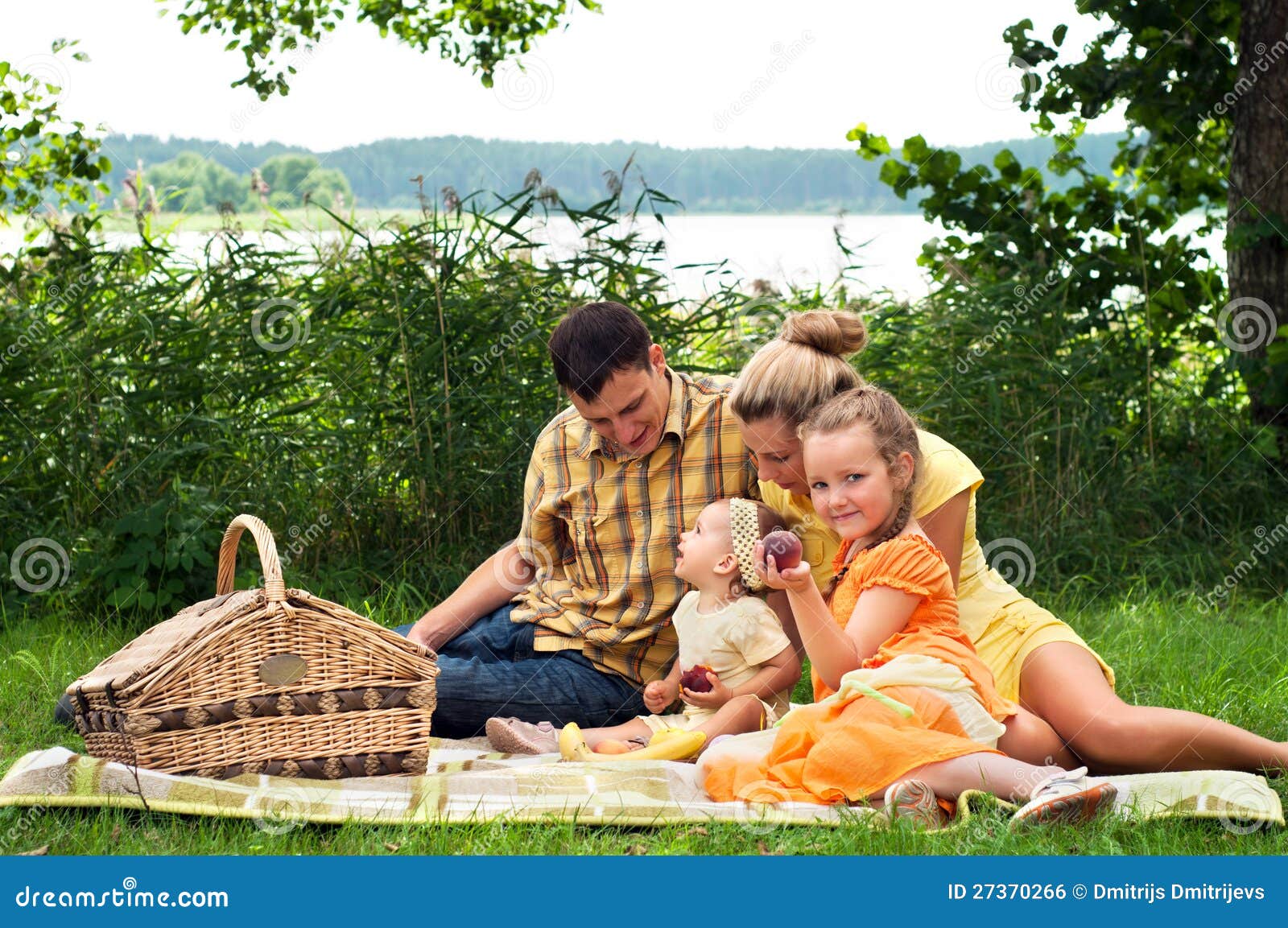 Happy Family Picnicking Outdoors Stock Photo - Image of countryside ...