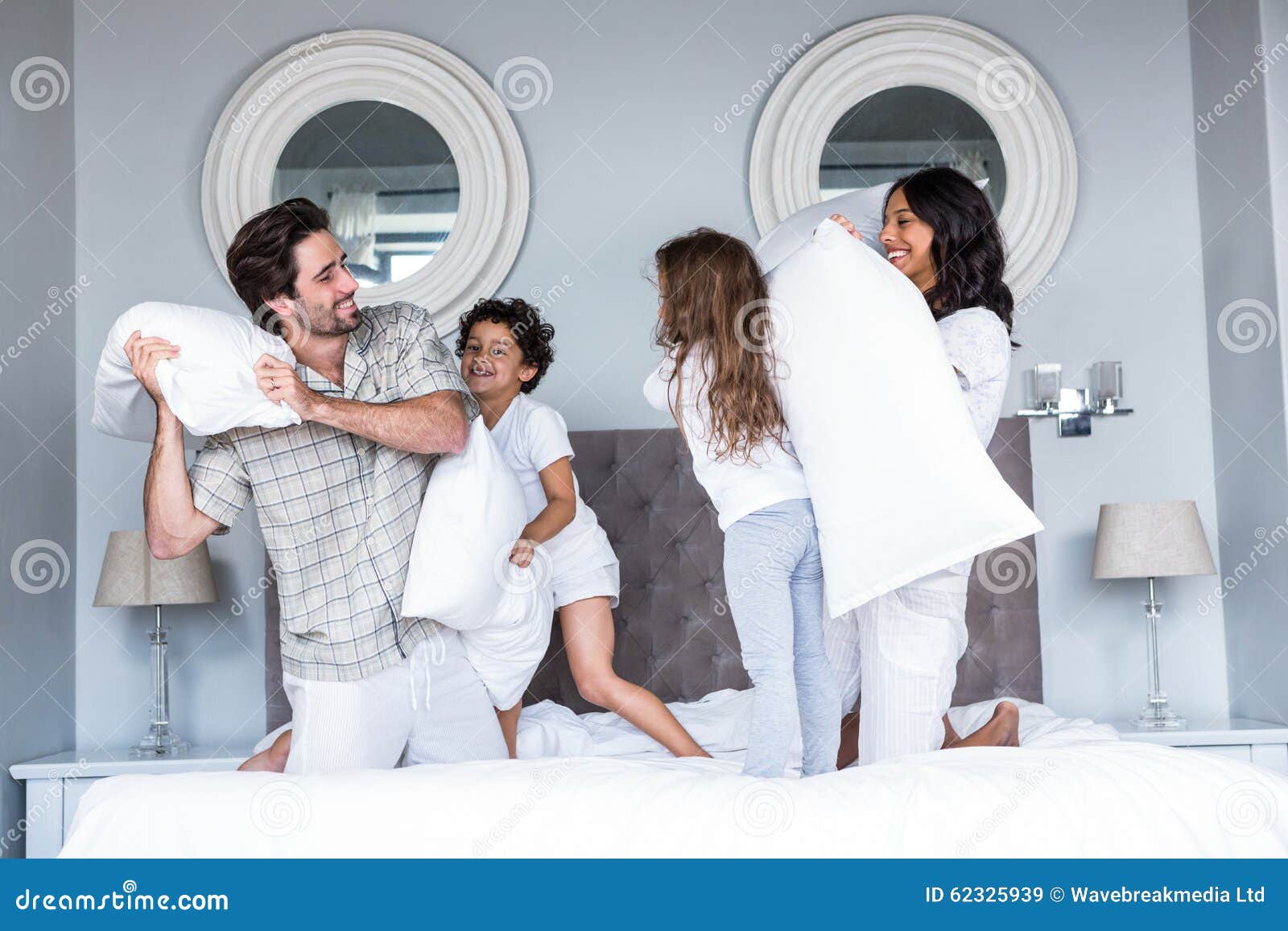 Happy Family Pillow Fighting Stock Image - Image of child, duvet: 62325939