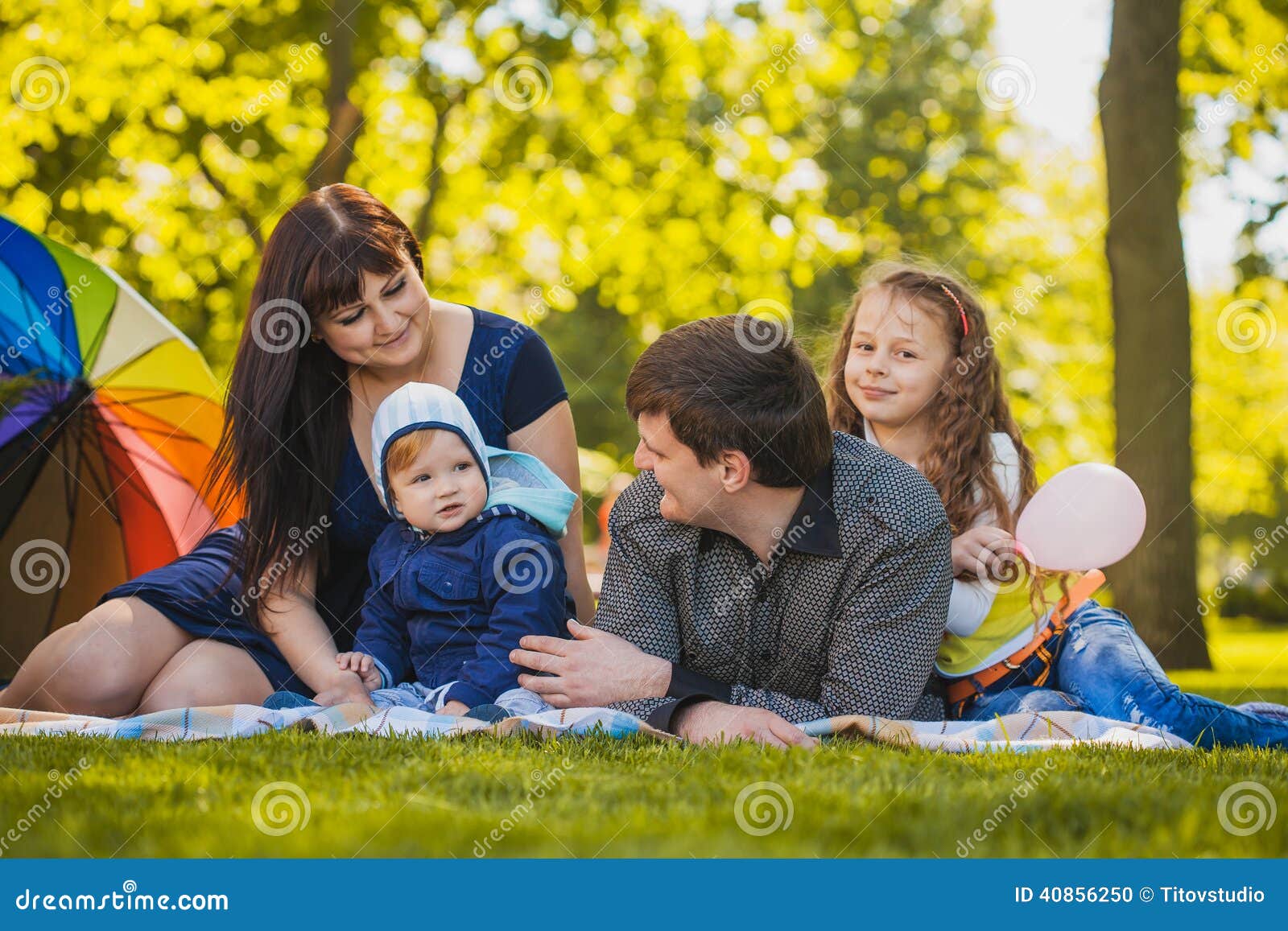 Happy Family are Plaing in the Park Stock Photo - Image of embrace ...