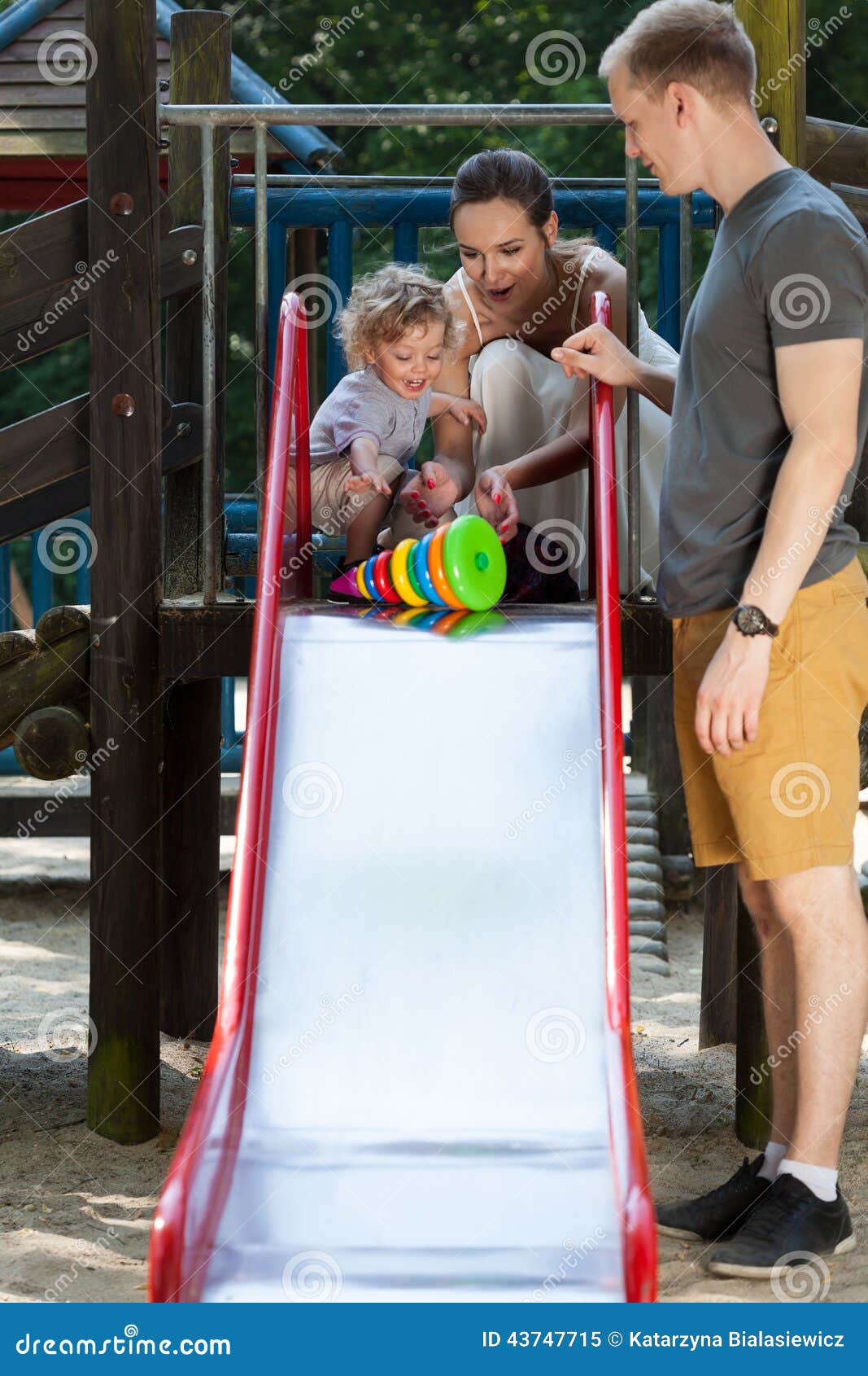Happy Family on the Playground Stock Image - Image of preschooler ...