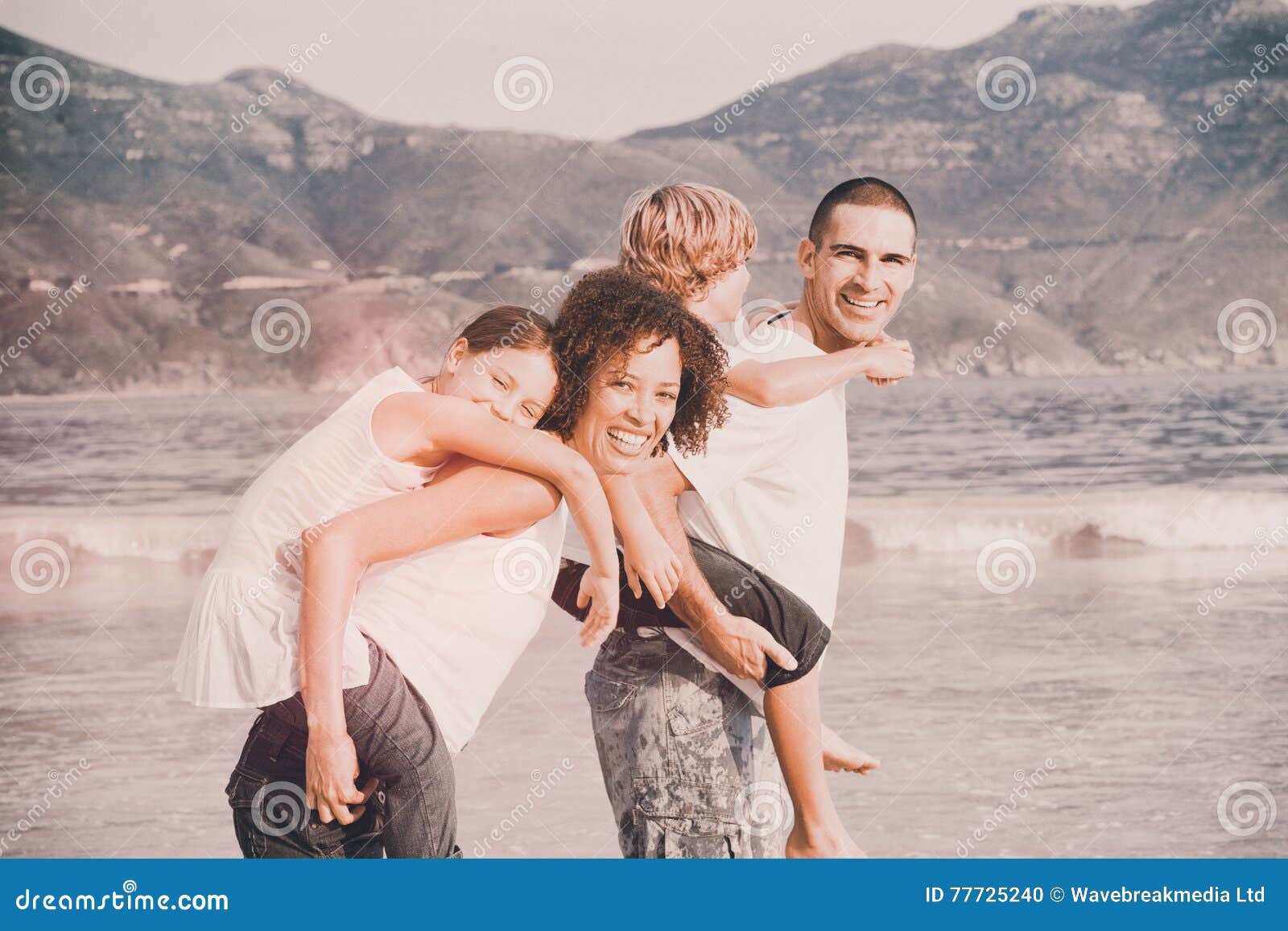 Happy Family Playing on the Beach Stock Photo - Image of sand, brother ...