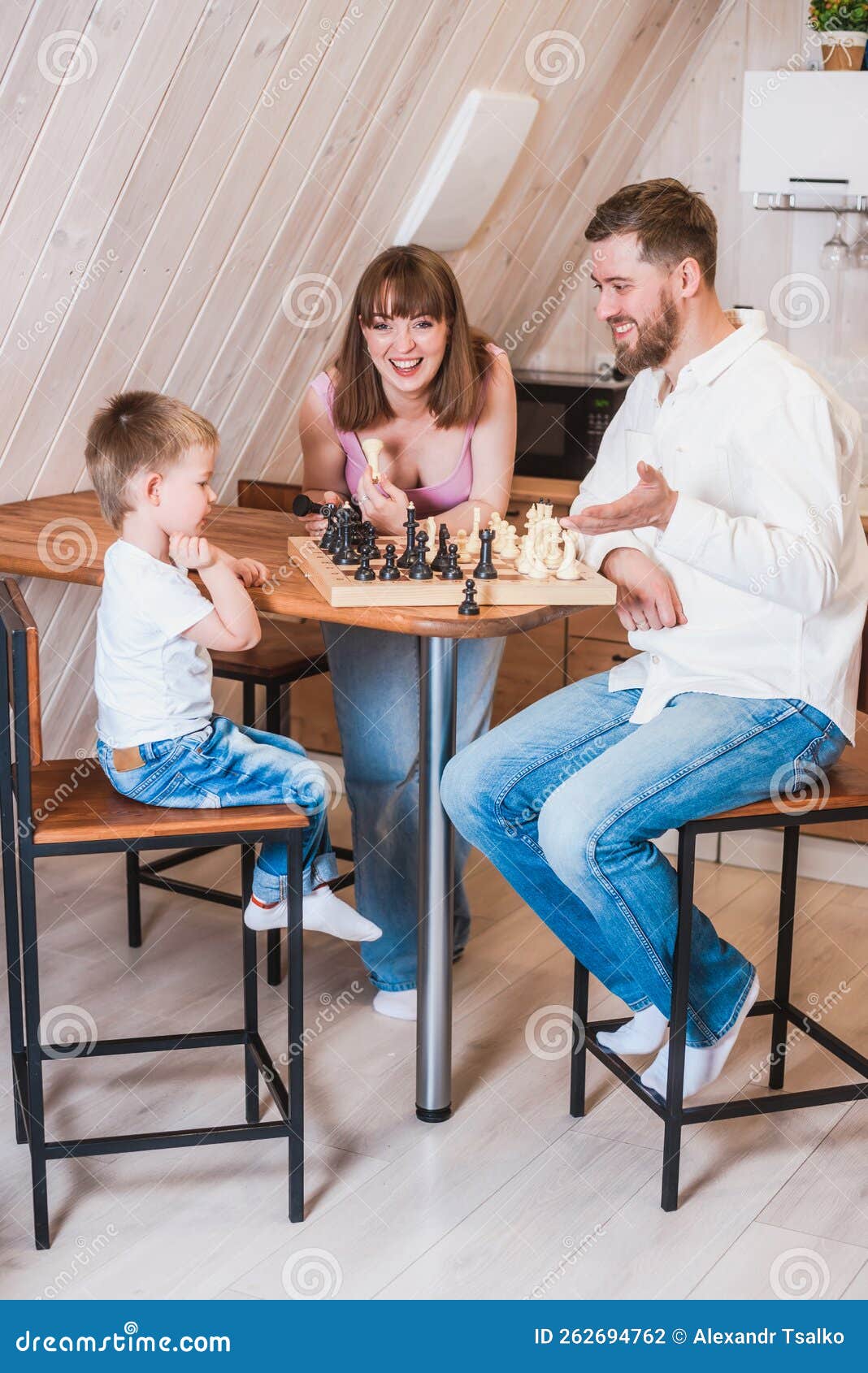 Happy Family Playing Chess in the Kitchen Stock Photo - Image of ...
