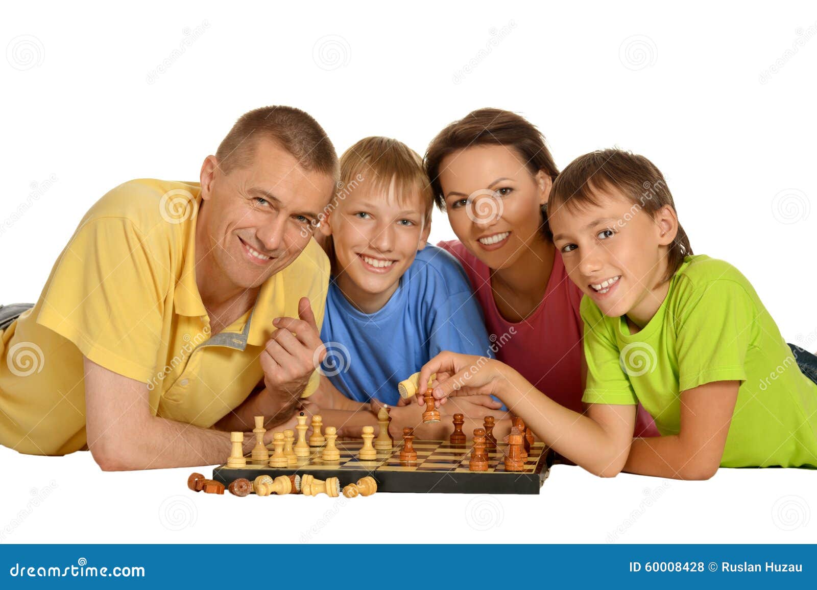 Happy family playing chess stock photo. Image of sons - 60008428
