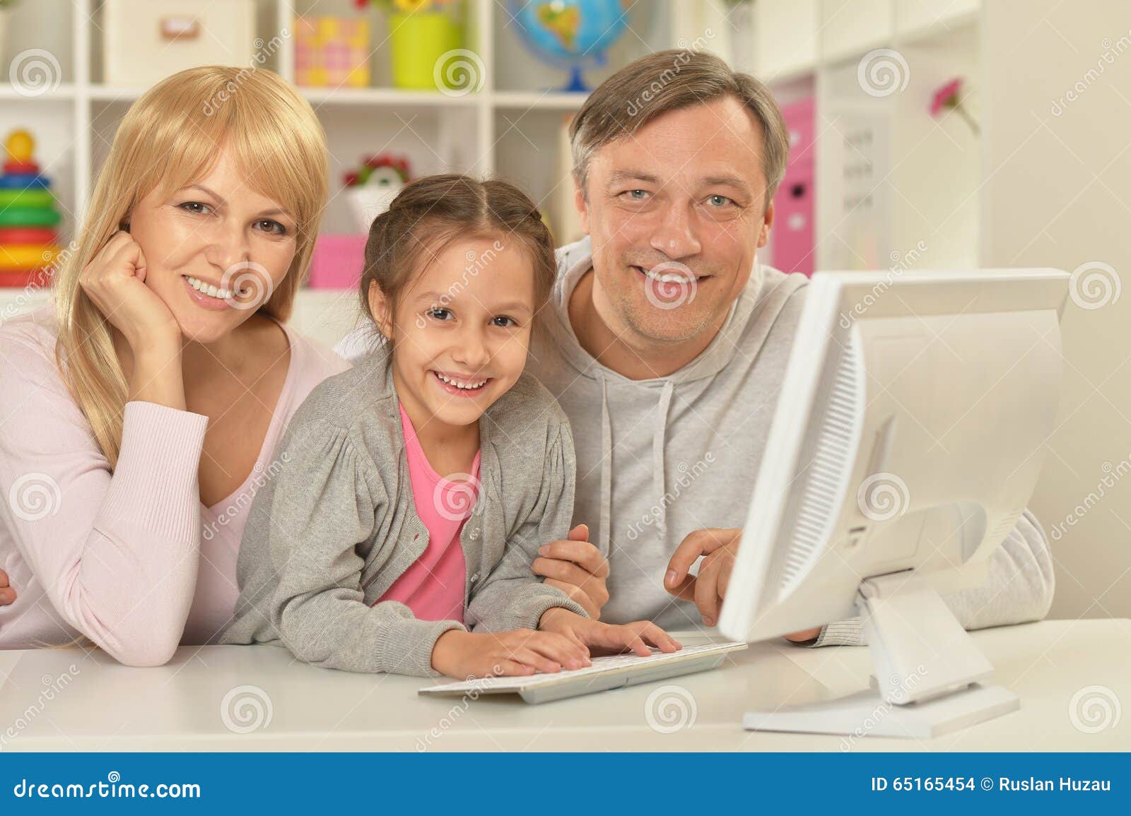 Happy Family Playing on Computer Stock Photo - Image of nice, lifestyle ...
