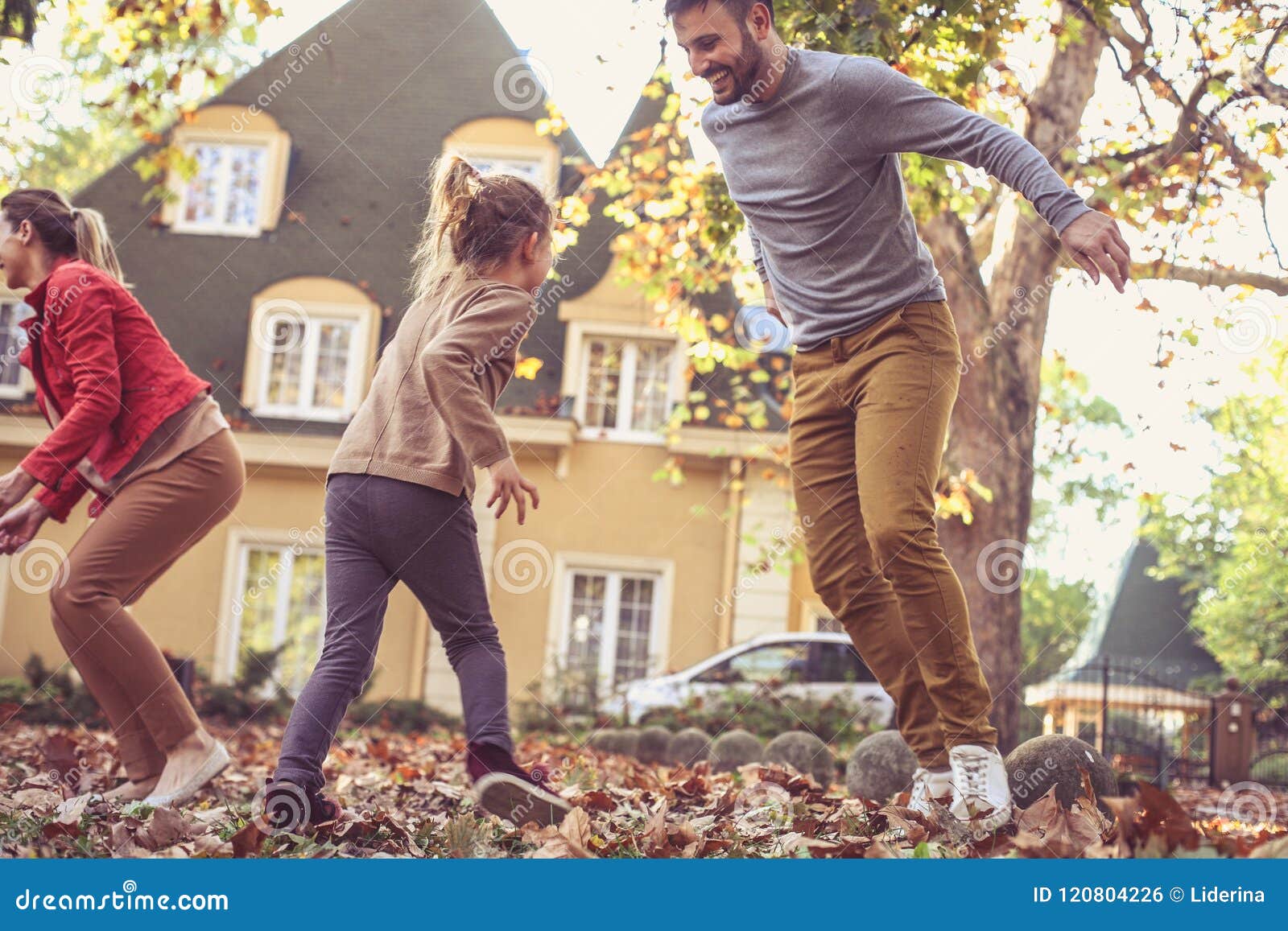 Happy Family Playing Outside. on the Move Stock Photo - Image of leaf ...