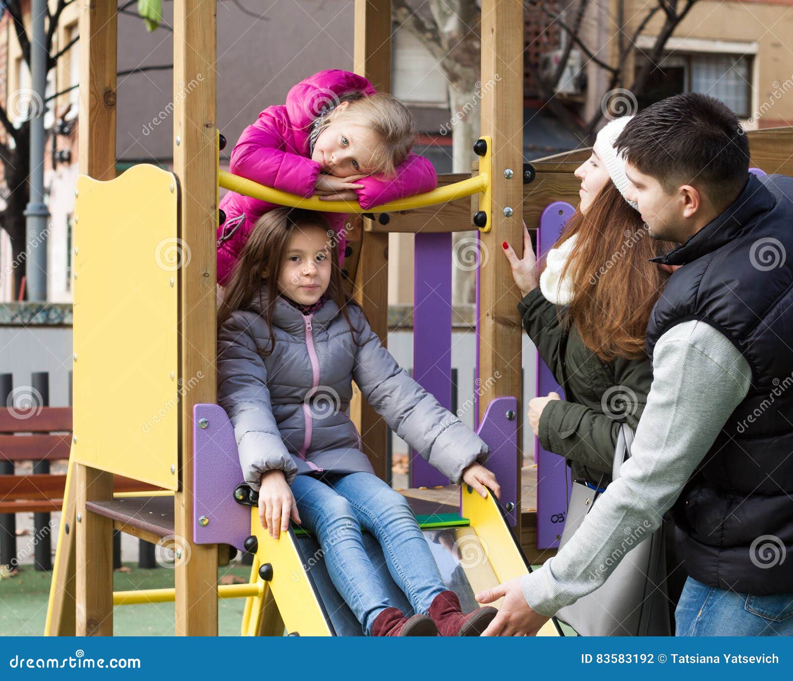 Happy Family Playing at Playground Stock Photo - Image of childhood ...