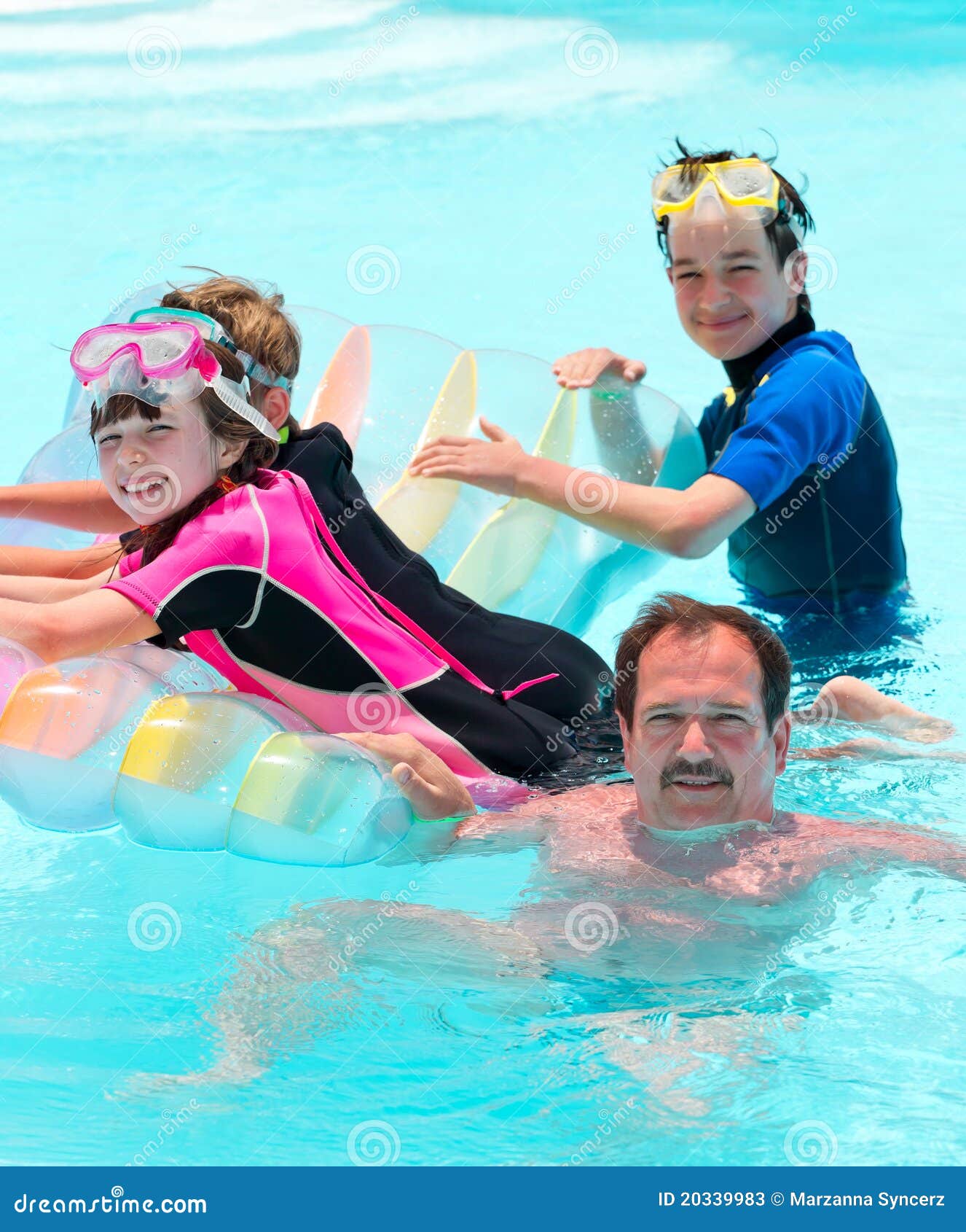 Happy Family Playing in Pool Stock Image - Image of cute, looking: 20339983