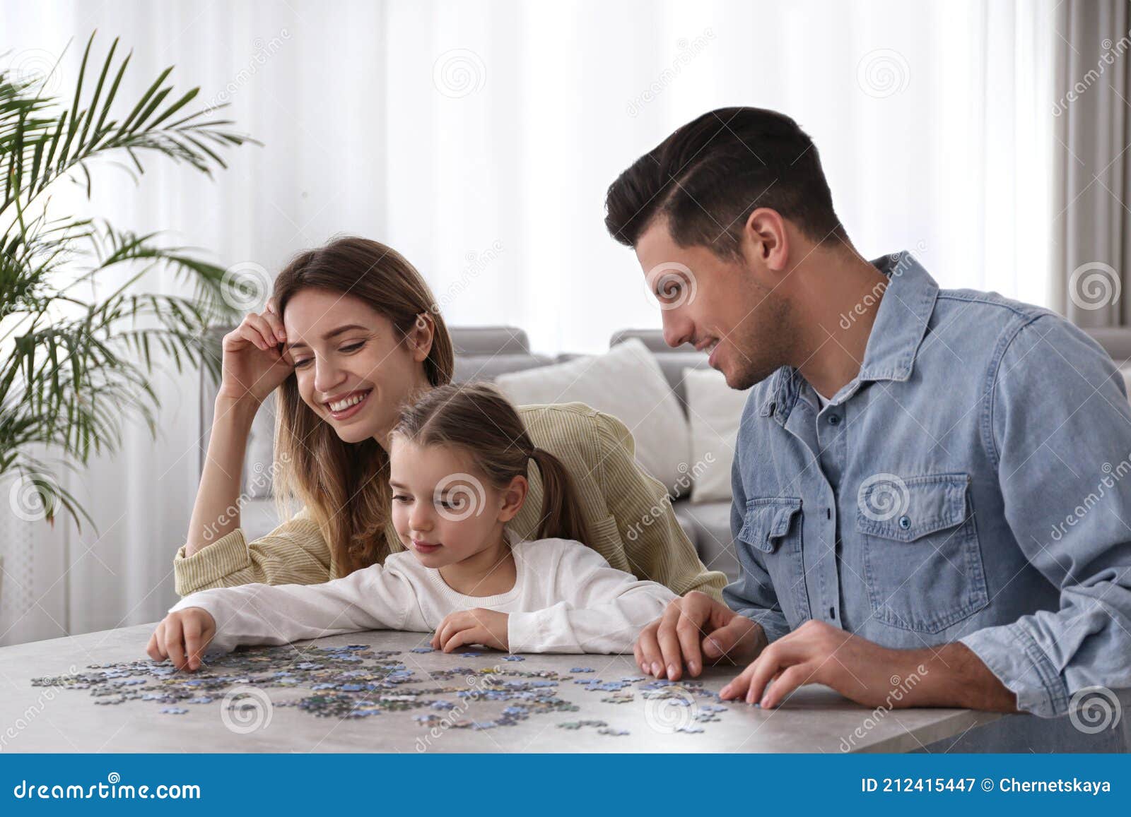 Happy Family Playing with Puzzles at Home Stock Image - Image of home ...