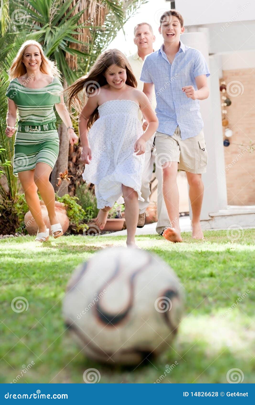 Happy Family Playing Soccer and Having Fun Stock Photo - Image of male ...