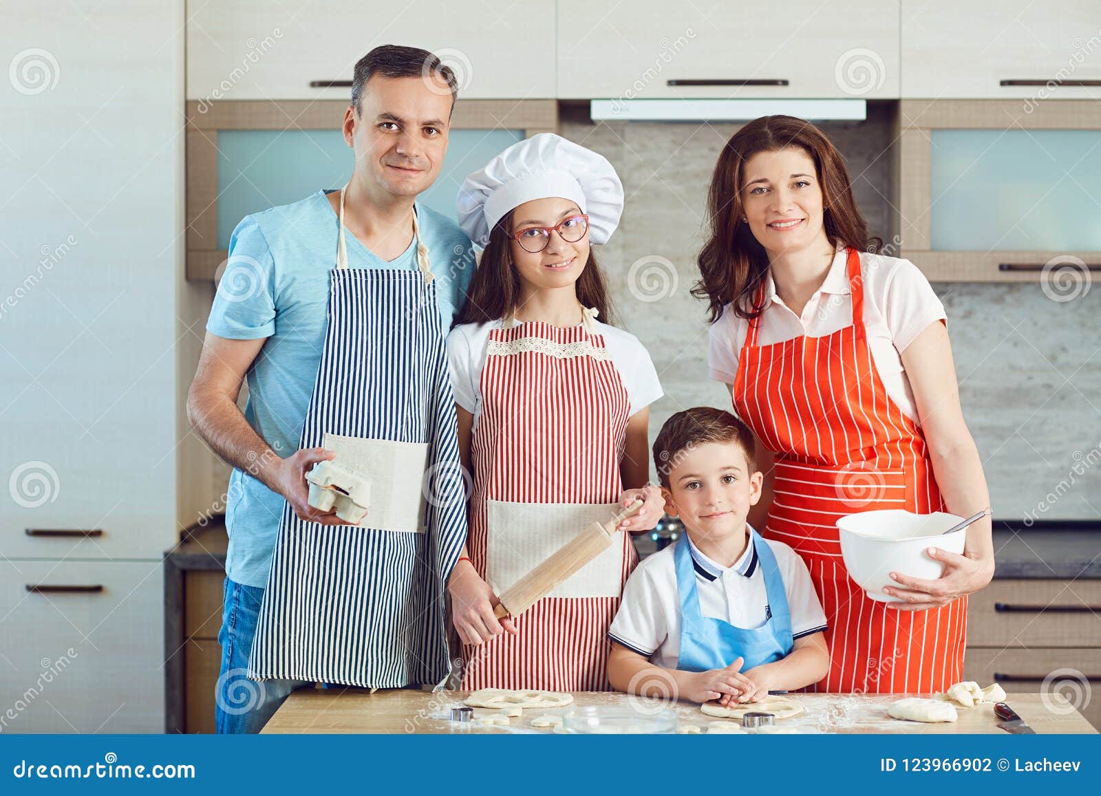 A Happy Family Prepares Baking in the Kitchen Stock Photo - Image of ...