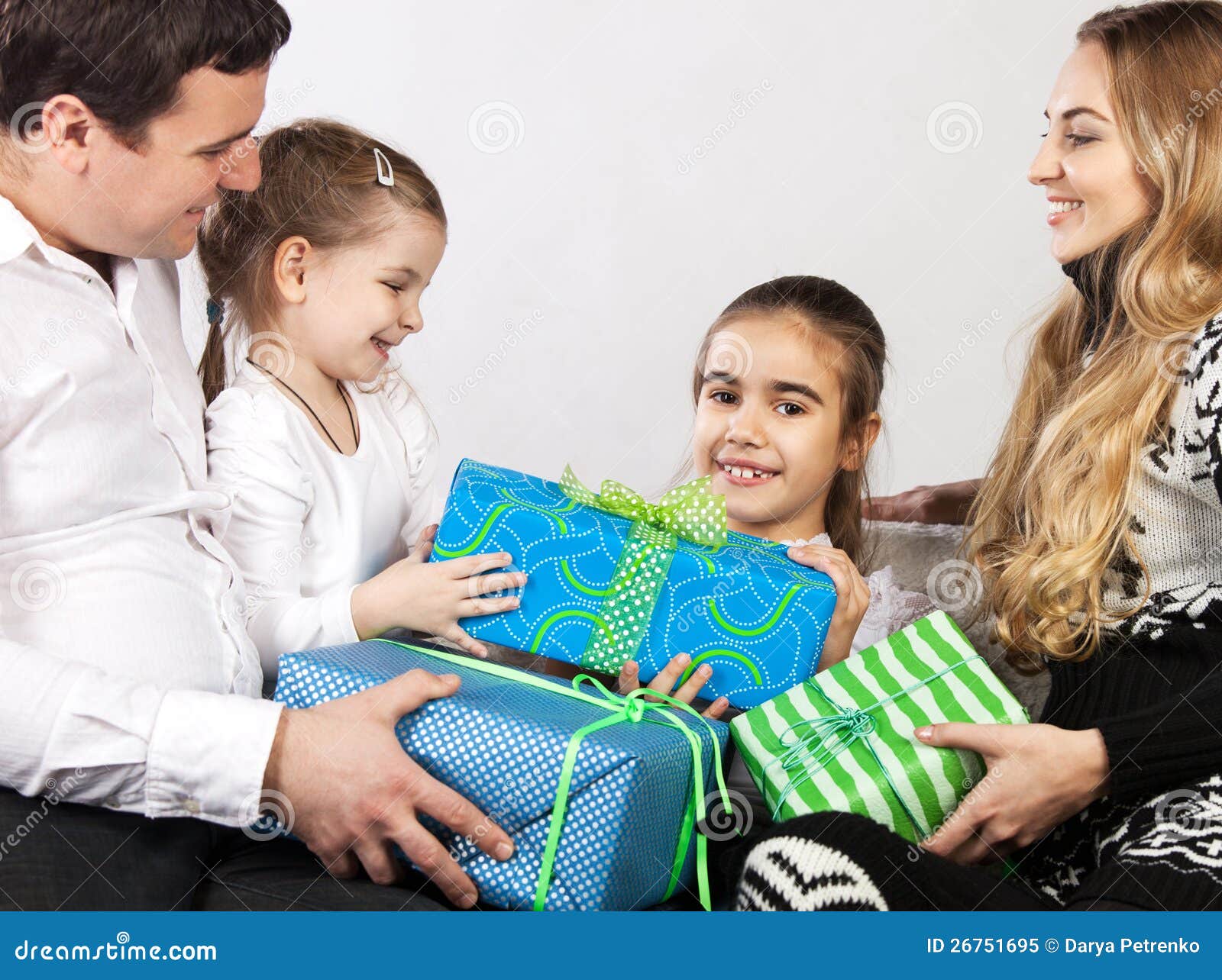 Happy family with presents stock image. Image of couple - 26751695