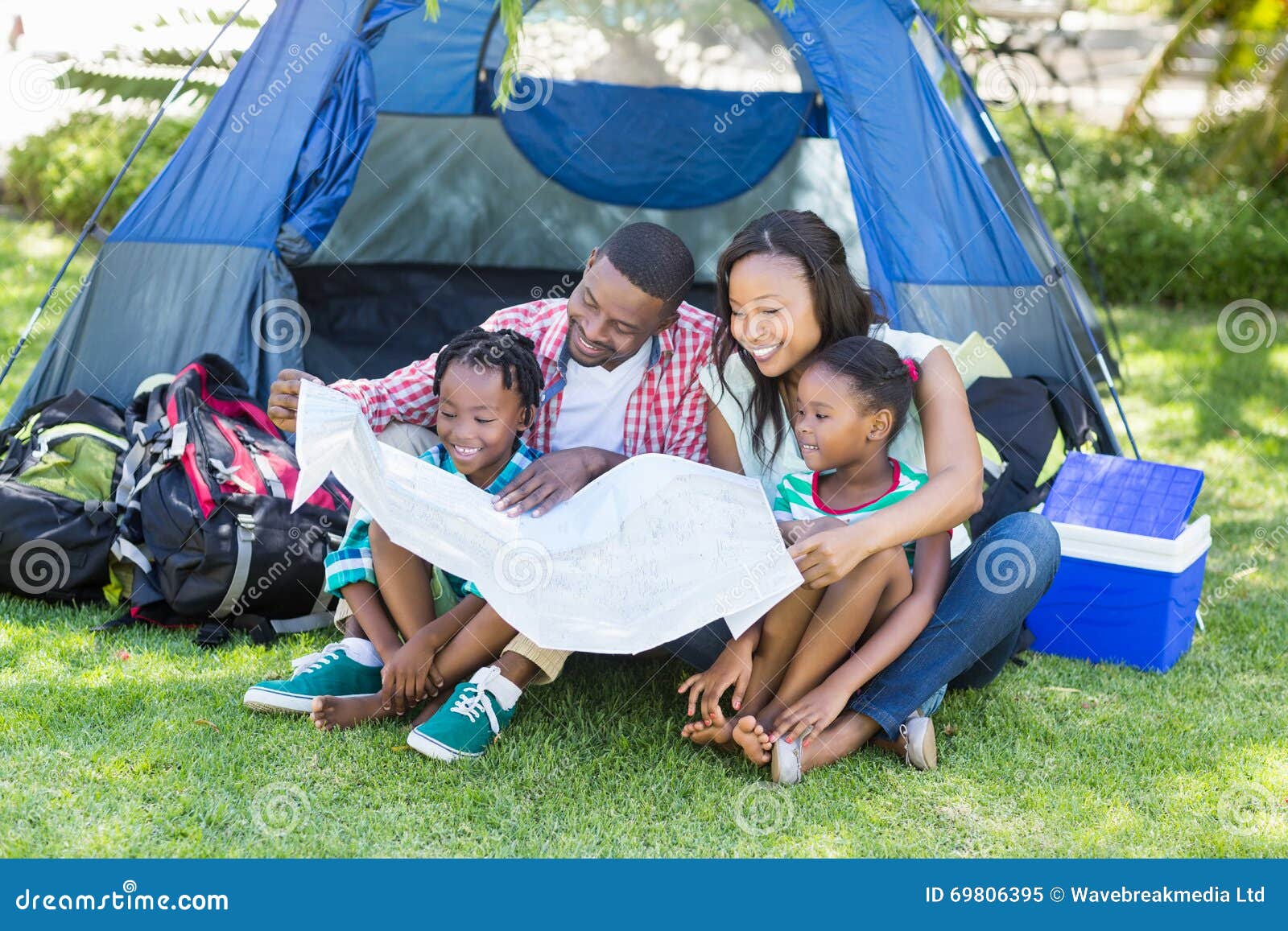 Happy Family Reading the Map Stock Image - Image of happy, leisure ...