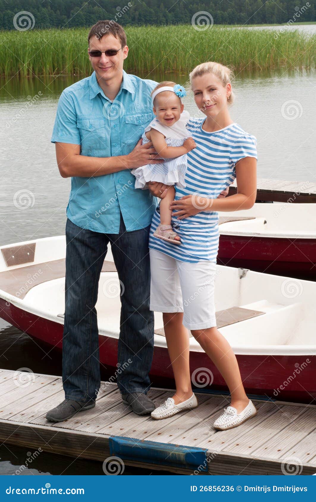 Happy Family on the River Bank Stock Photo - Image of park, countryside ...