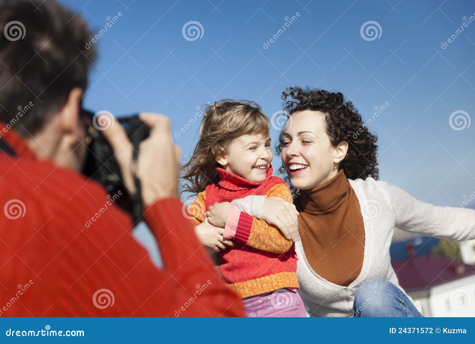 Happy family shooting stock photo. Image of hand, outdoors - 24371572