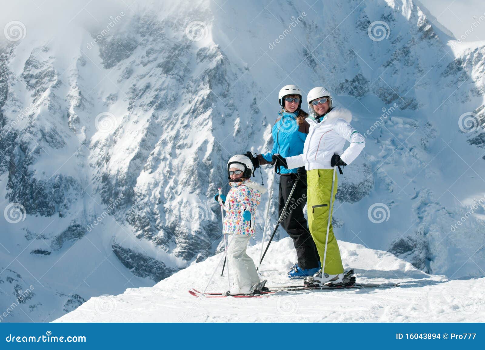 Happy family on ski stock photo. Image of parent, happiness - 16043894
