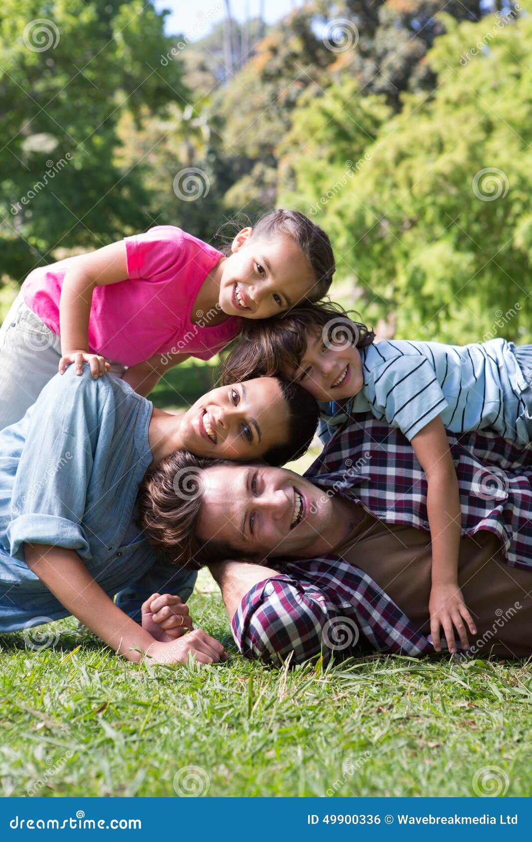 Happy Family Smiling at Camera Stock Photo - Image of love, adult: 49900336