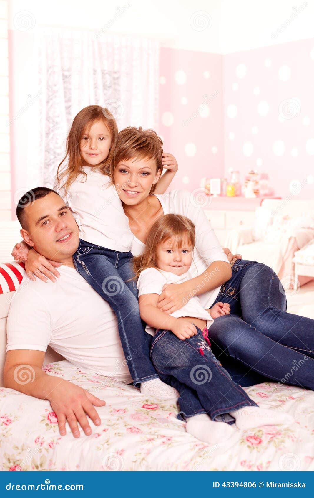 Happy Family Smiling at Home Stock Photo - Image of indoors, lifestyle ...