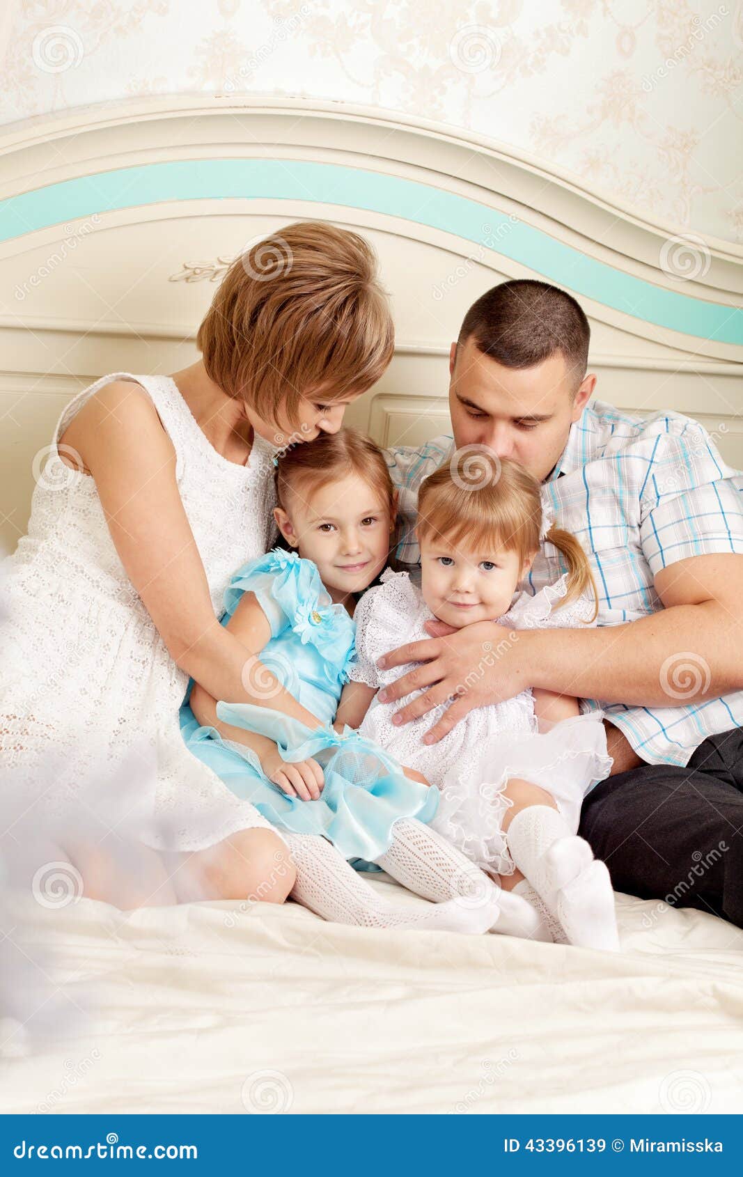 Happy Family Smiling at Home Stock Image - Image of mother, cute: 43396139
