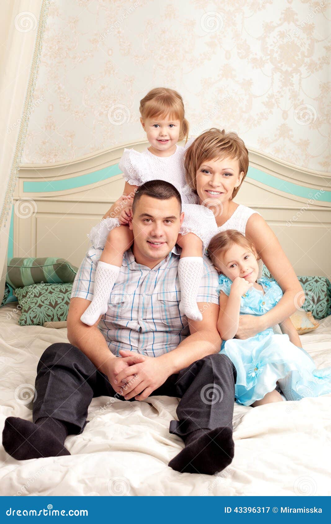 Happy Family Smiling at Home Stock Image - Image of affection, living ...