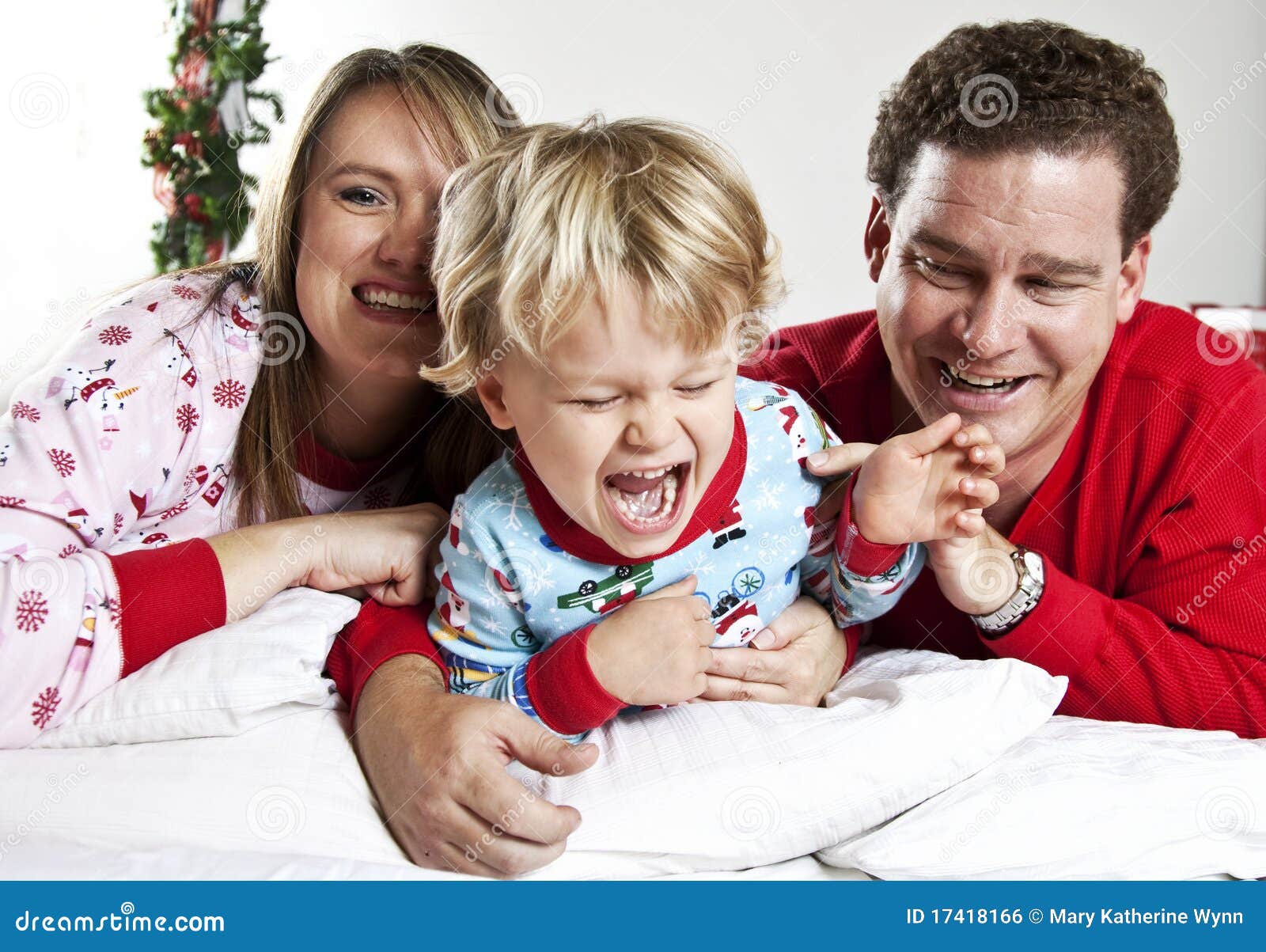 Happy Family snuggle stock photo. Image of joyous, excited - 17418166