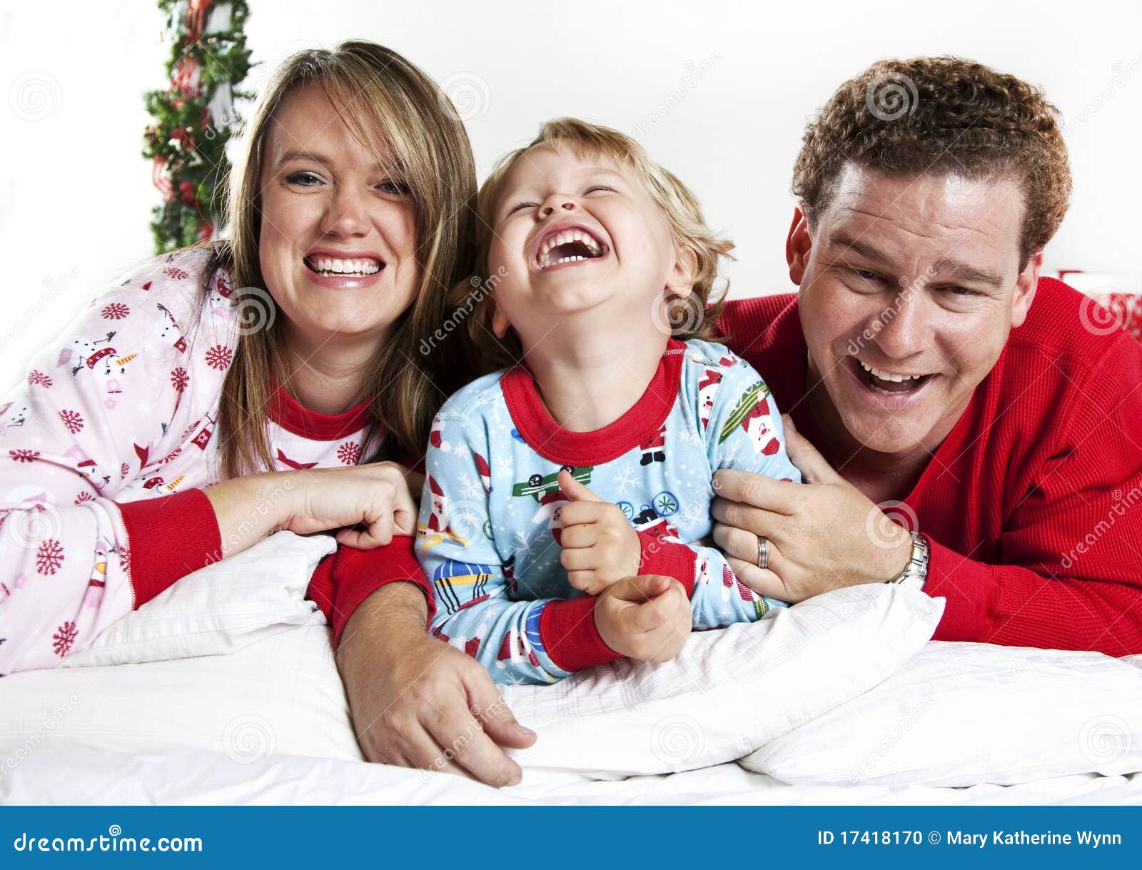 Happy Family snuggle stock photo. Image of giggle, family - 17418170