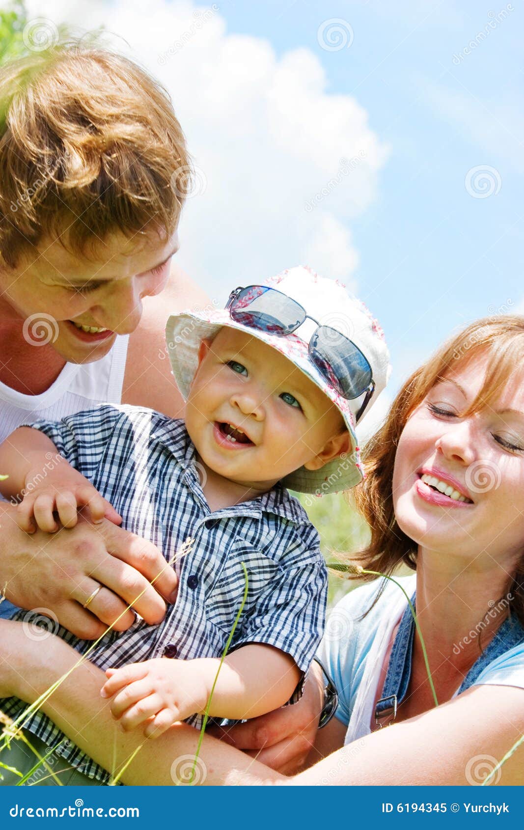 Happy Family with Son Over Blue Sky Background Stock Image - Image of ...