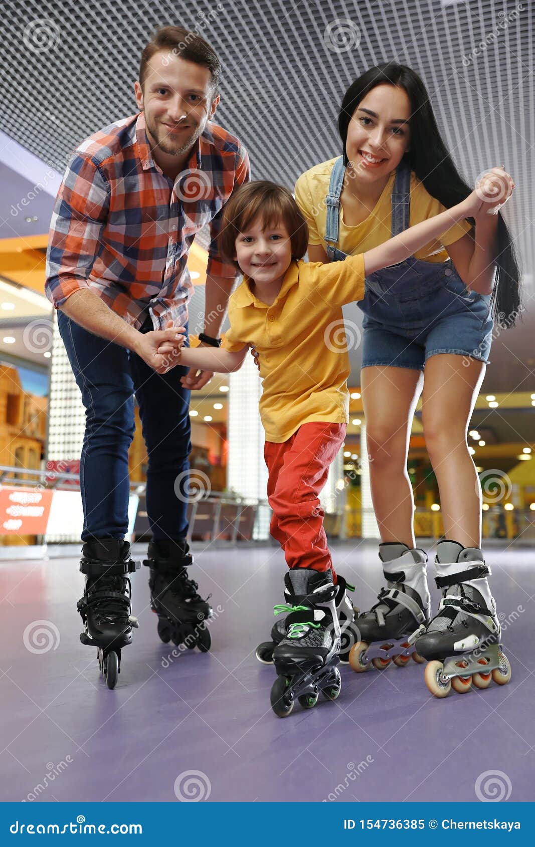 Happy Family Spending Time at Roller Rink Stock Image - Image of rest ...