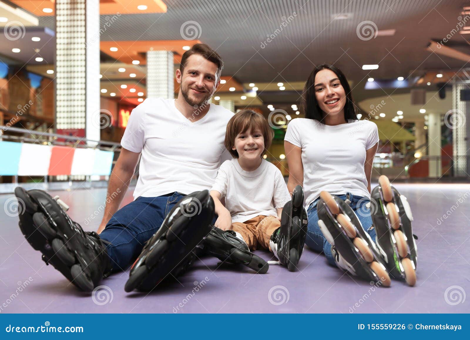 Happy Family Spending Time at Roller Rink Stock Photo - Image of ...