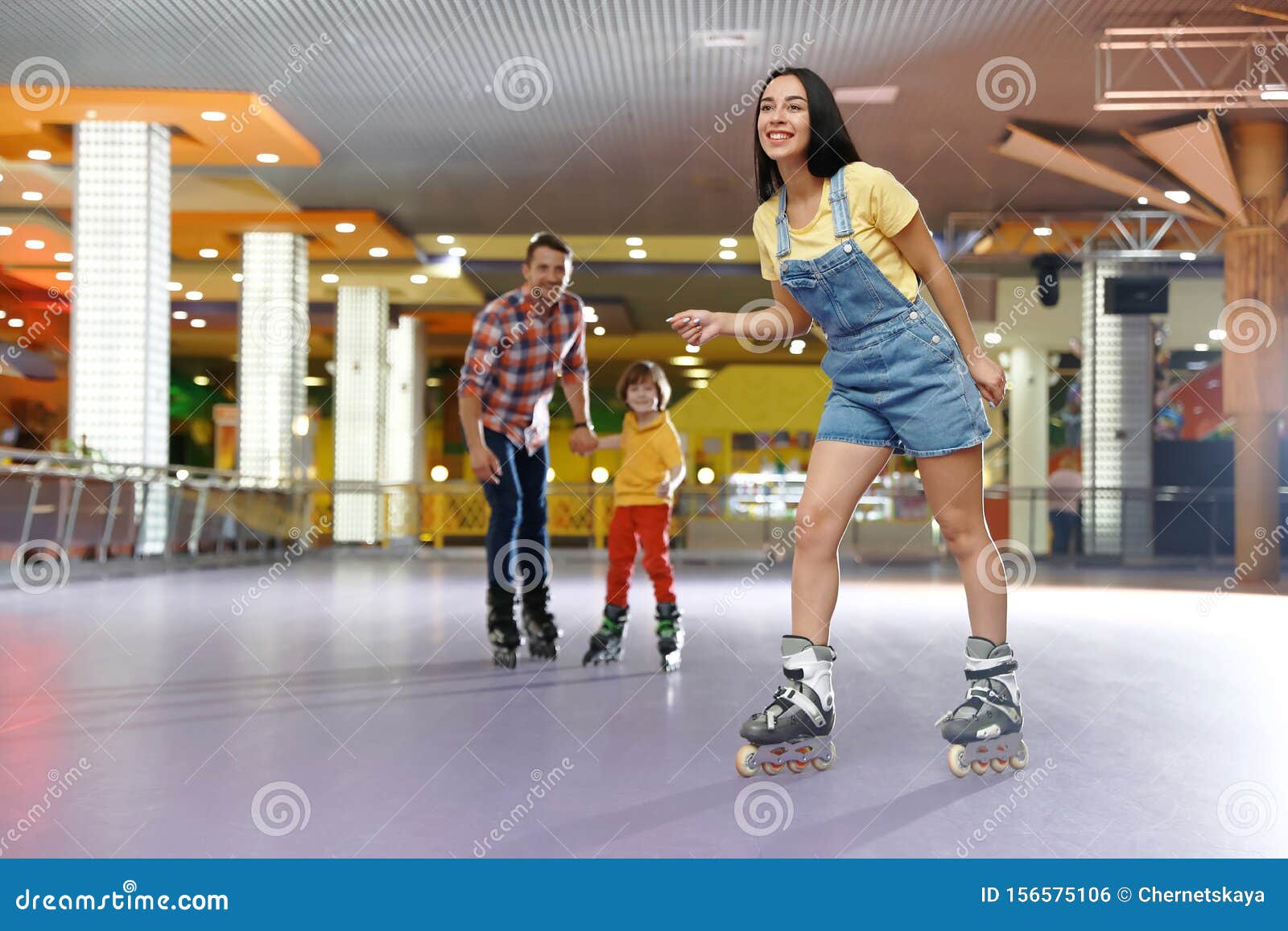 Happy Family Spending Time at Roller Skating Stock Photo - Image of ...