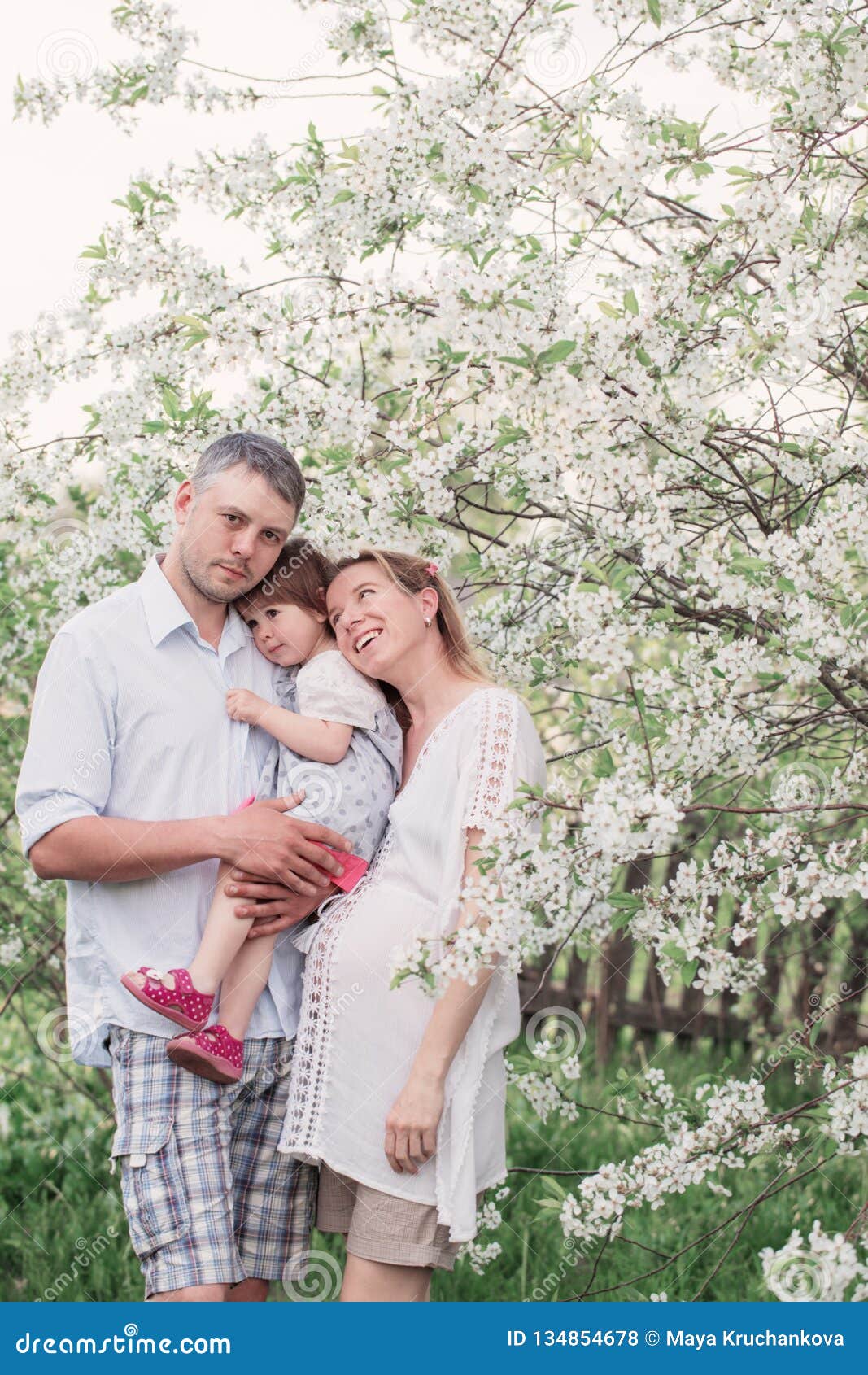 Happy Family on Spring Garden Stock Photo - Image of meadow, love ...