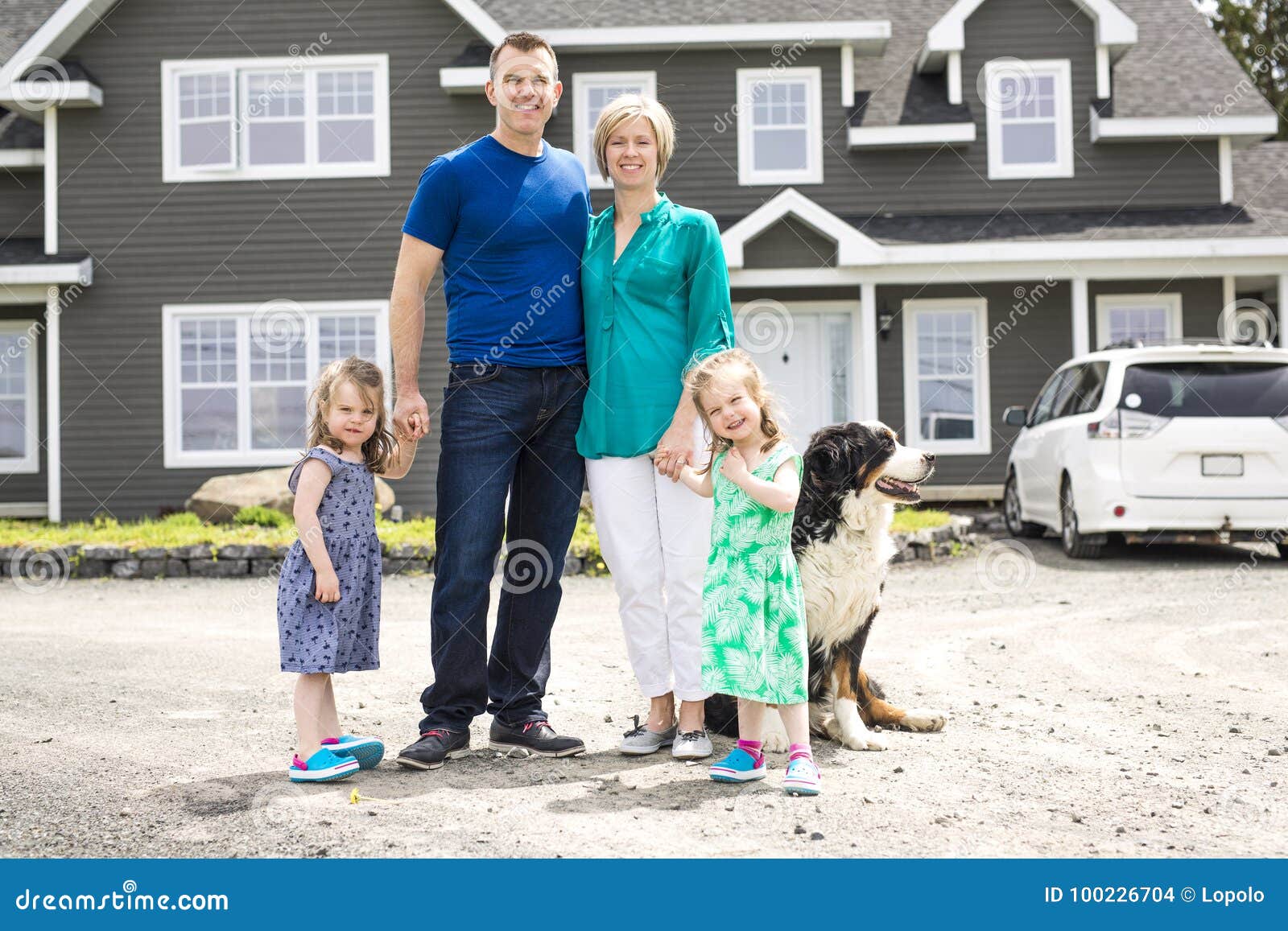 Happy Family Standing in Front of the House Stock Photo - Image of ... Happy Family Standing in Front of the House Stock Photo - Image of ...