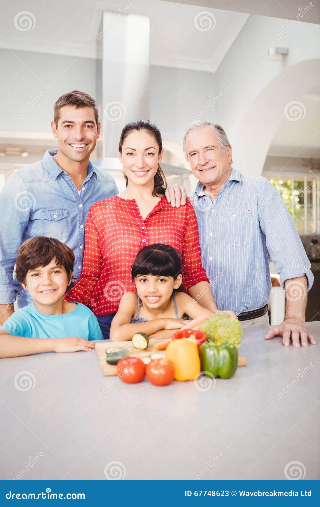 Happy Family Standing by Kitchen Table at Home Stock Image - Image of ...