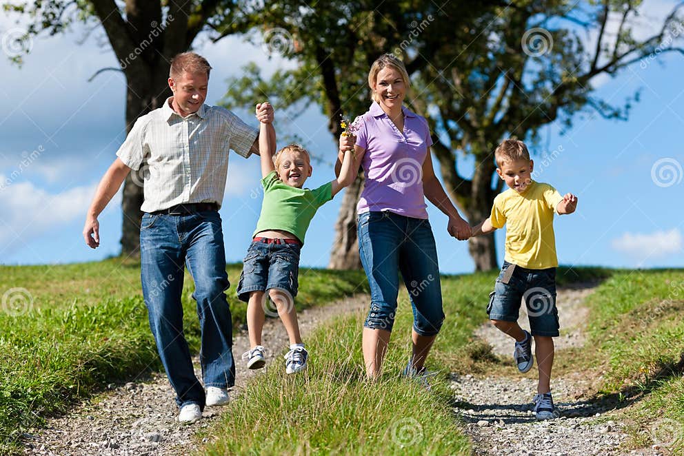 Happy family in summer stock photo. Image of field, mother - 22833200