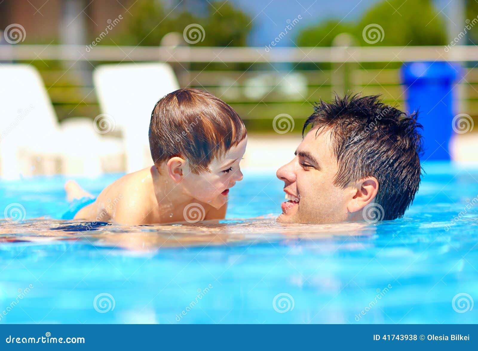 Happy Family in Summer Pool Stock Photo - Image of child, lifestyle ...
