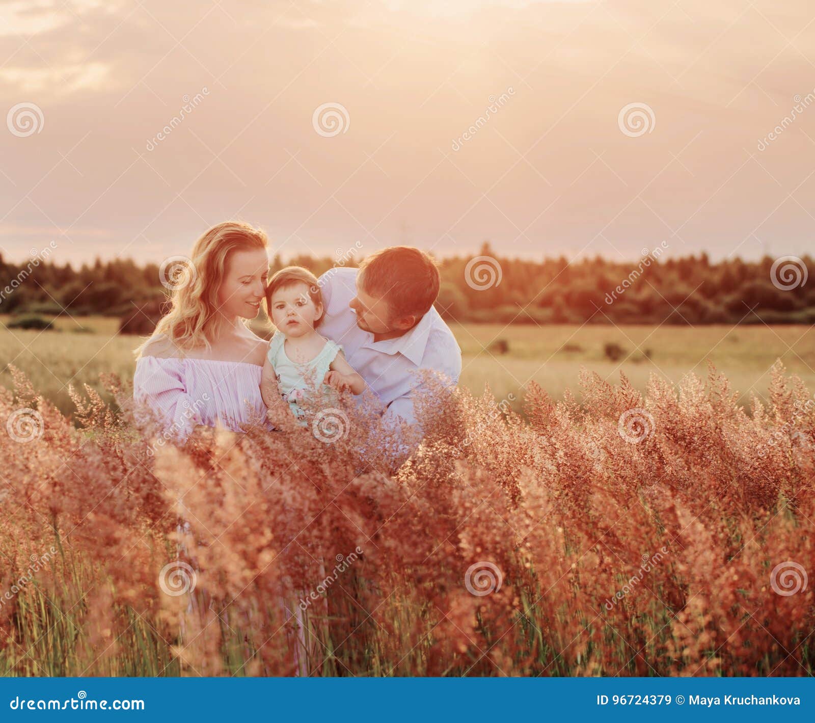 Happy family at sunset stock image. Image of people, portrait - 96724379
