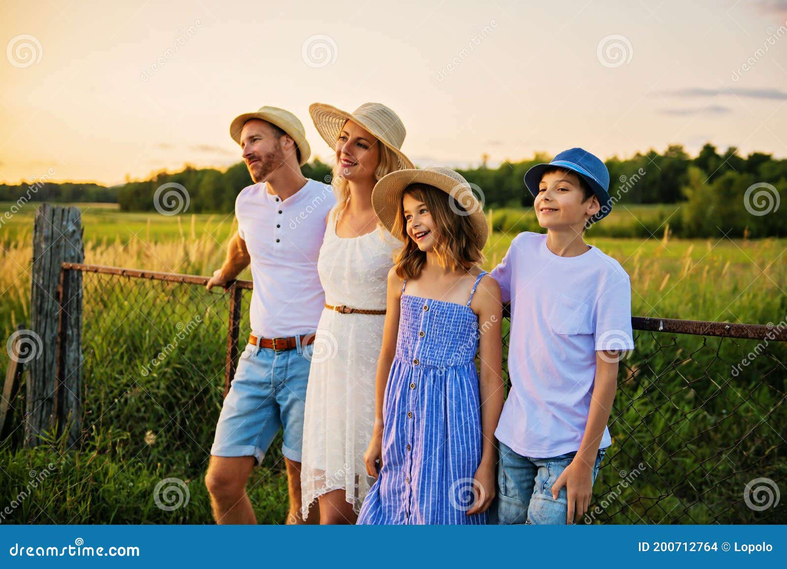 Happy Family at Sunset. they Having Fun and Playing in Nature at Sunset ...