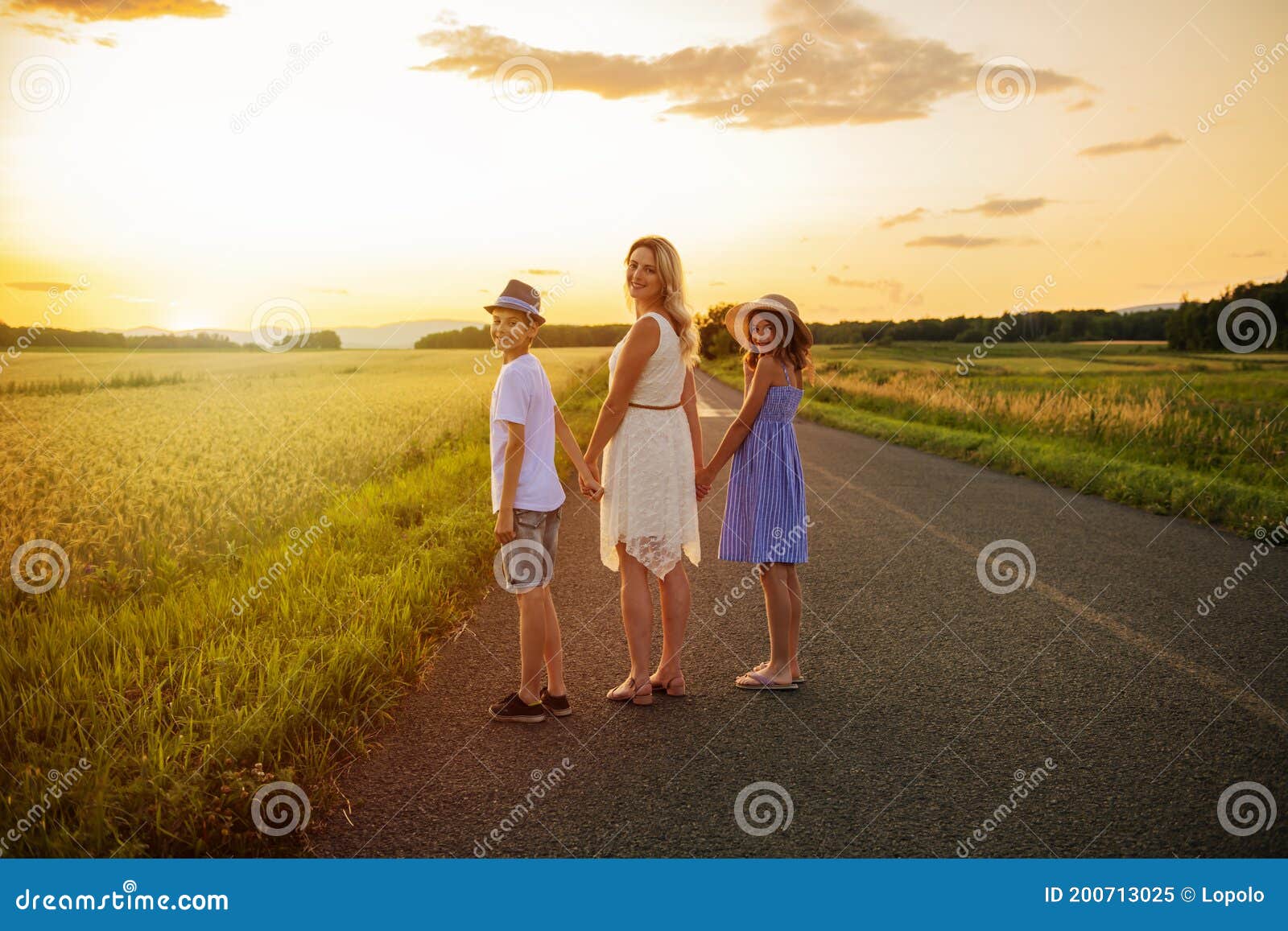 Happy Family at Sunset. they Having Fun and Playing in Nature at Sunset ...