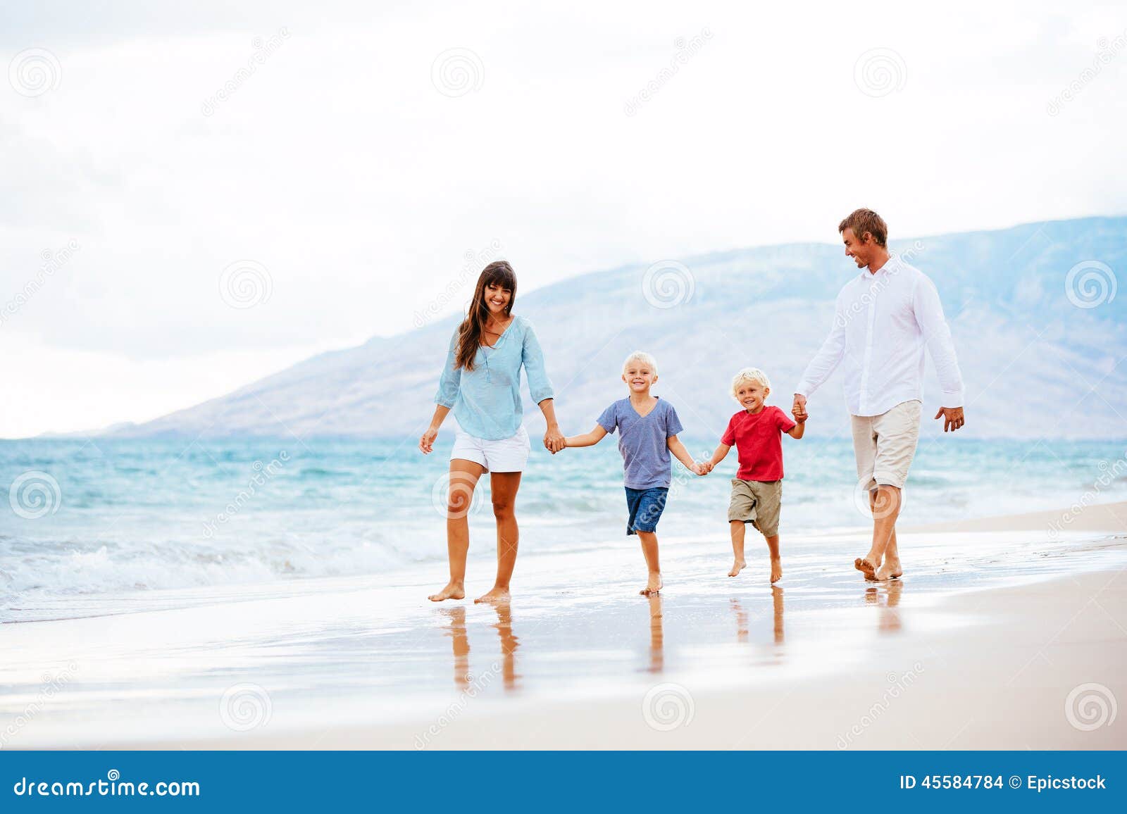 Happy Family at Sunset stock photo. Image of sunset, beach - 45584784