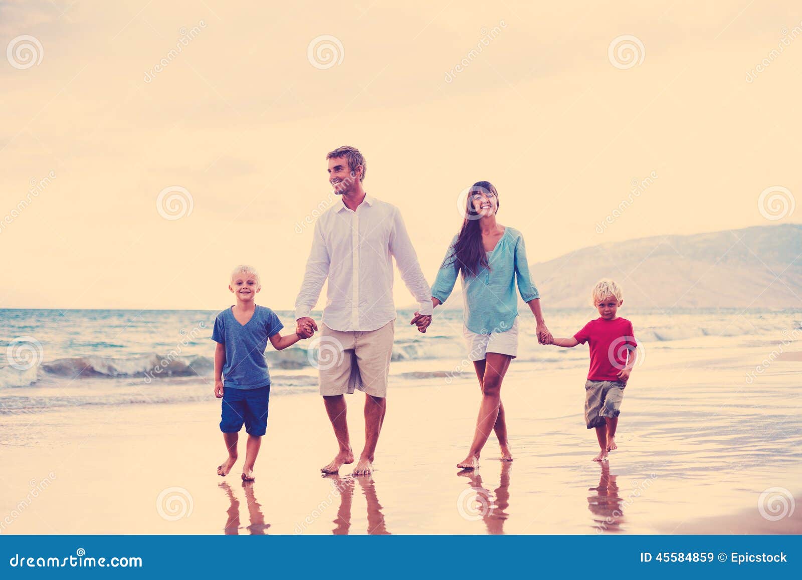 Happy Family at Sunset stock image. Image of sand, beach - 45584859