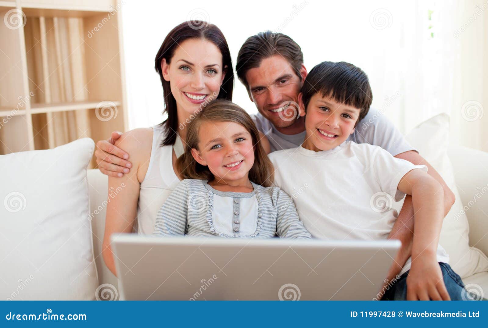 Happy Family Surfing the Internet Stock Photo - Image of male, love ...