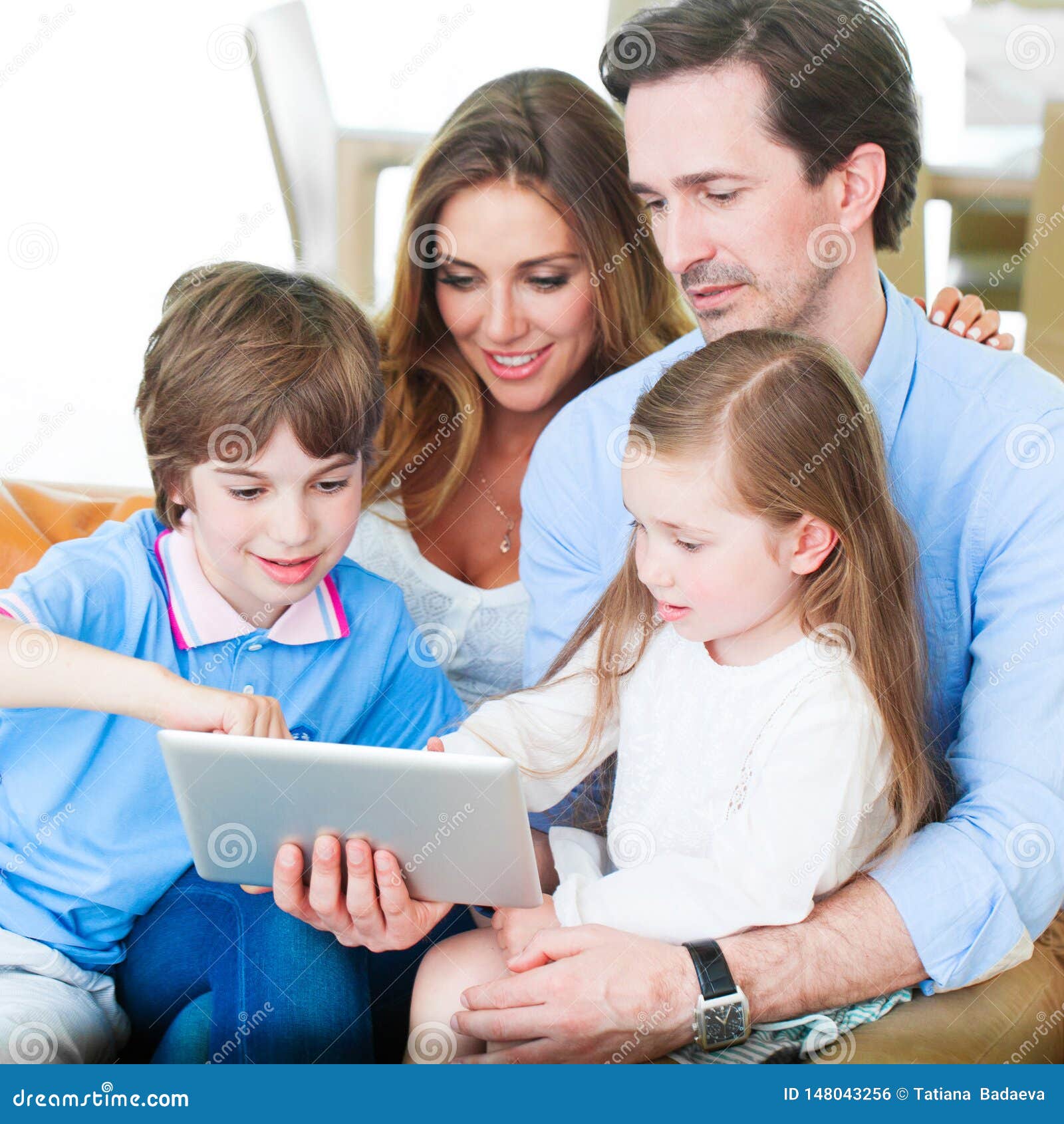 Happy Family with Tablet Pc Stock Photo - Image of smiling, cheerful ...