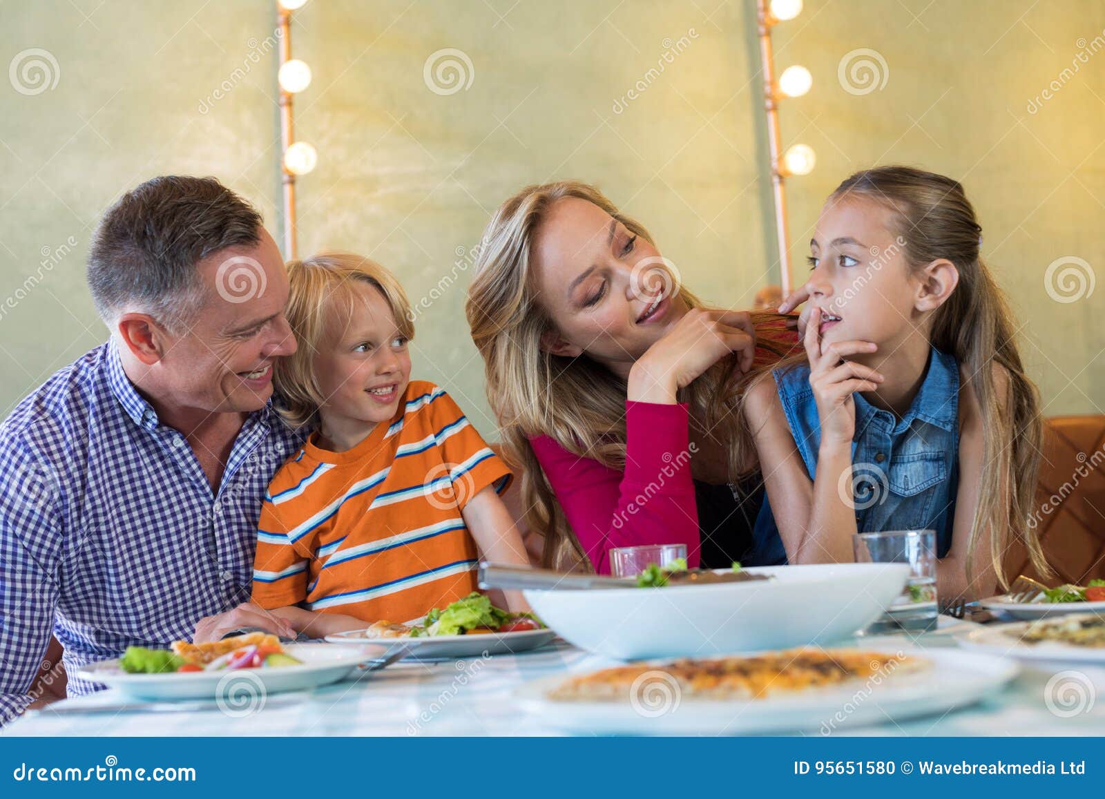 Happy Family Talking Dining at Restaurant Stock Photo - Image of dinner ...