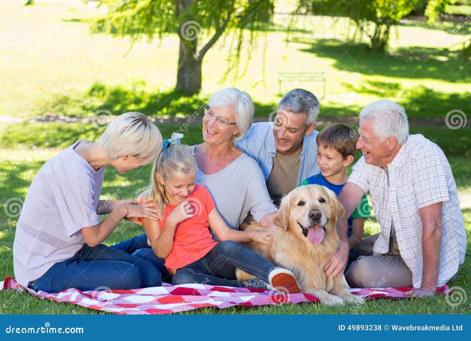 Happy Family Talking in the Park Stock Photo - Image of adult, daughter ...