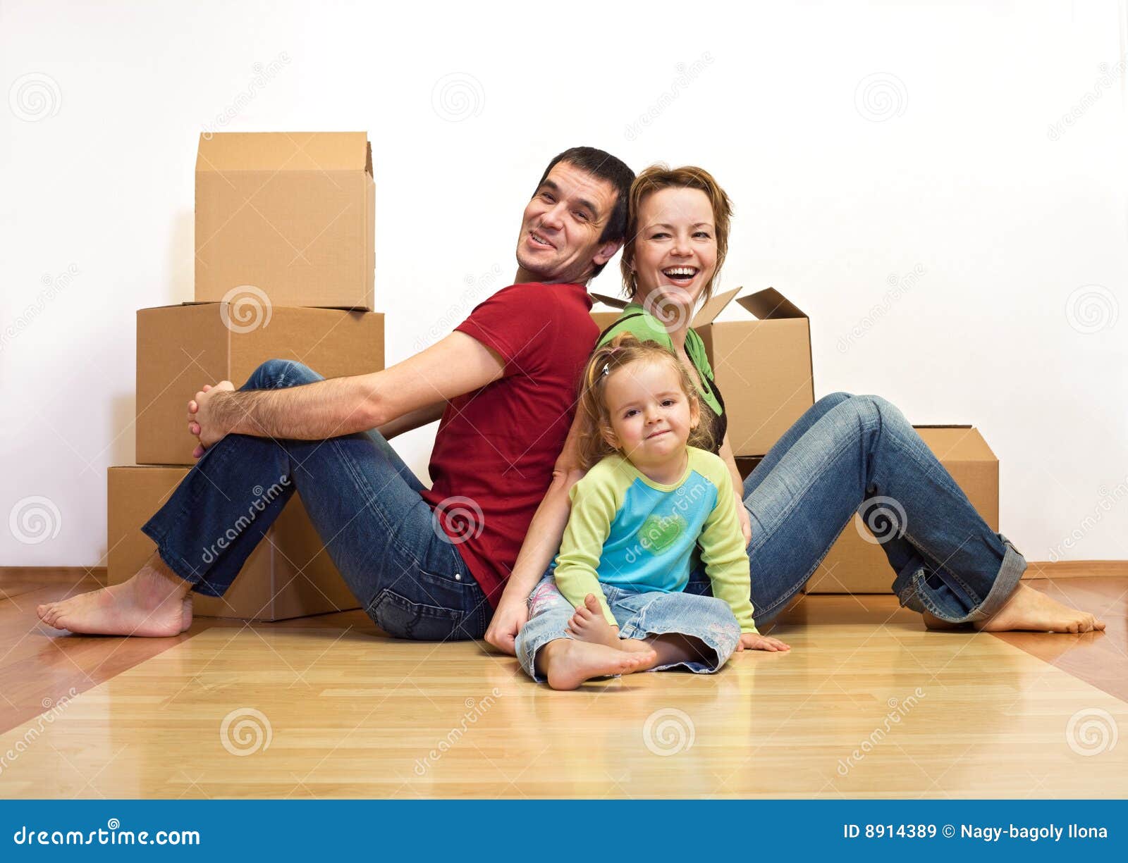 Happy Family in Their New Home Stock Image - Image of family, play: 8914389 Happy Family in Their New Home Stock Image - Image of family, play: 8914389