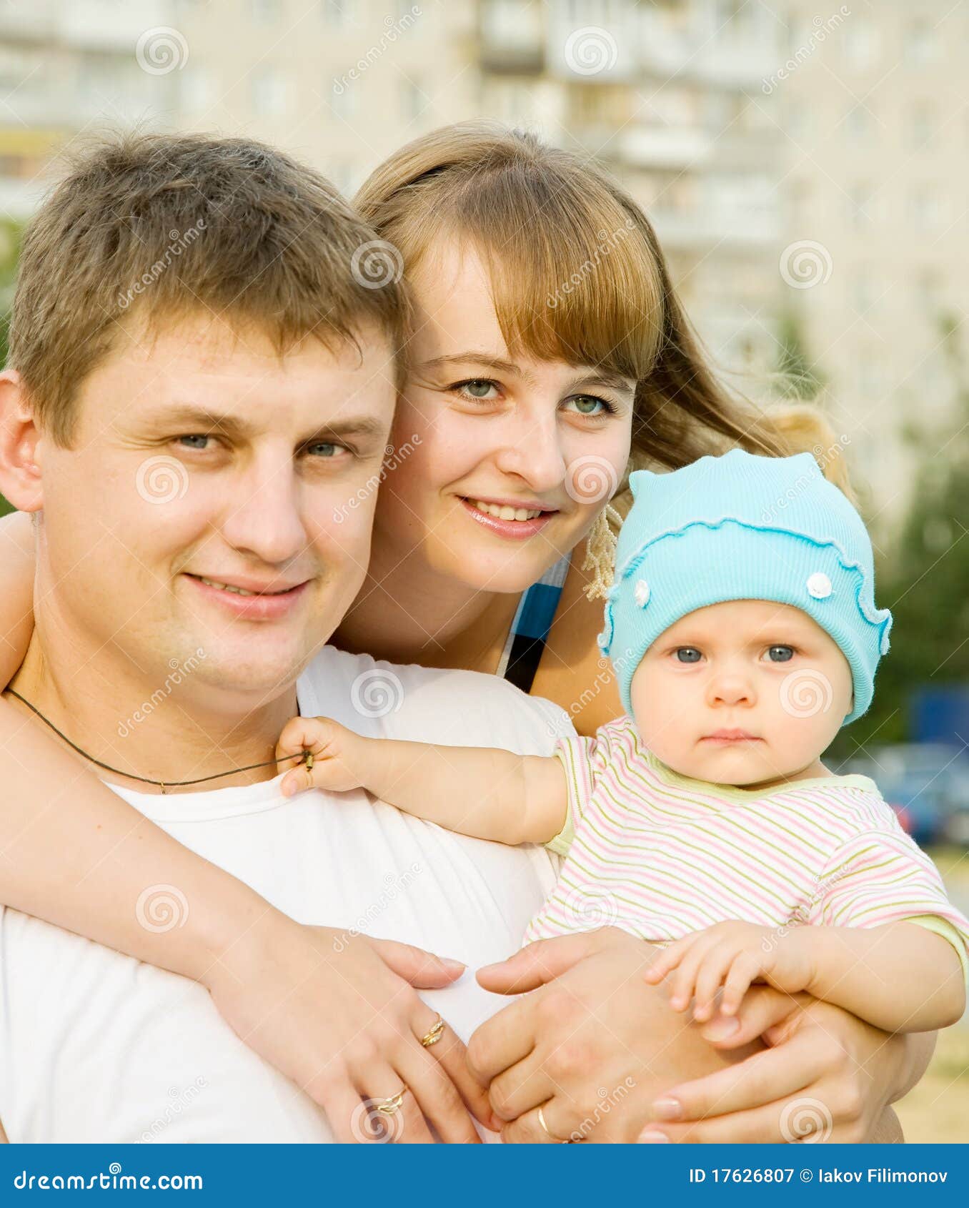 Happy family of three stock image. Image of city, male - 17626807
