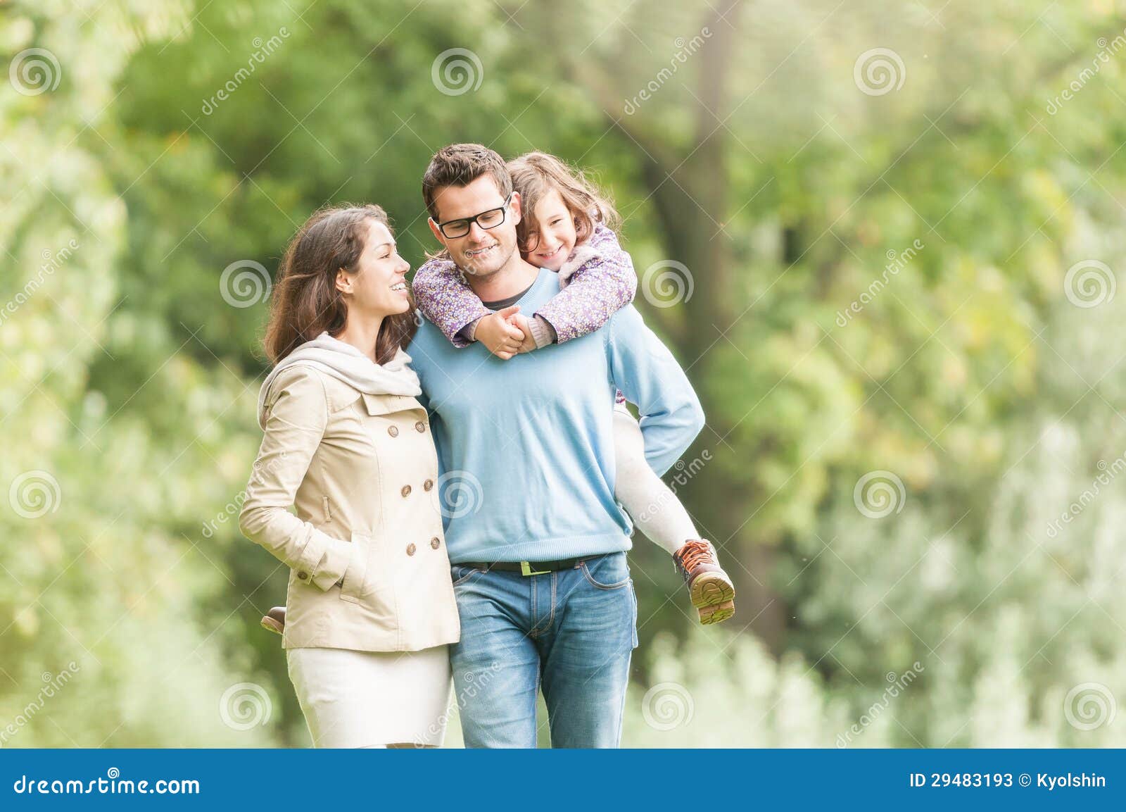 Happy Family of Three Having Fun Outdoor. Stock Image - Image of back ...