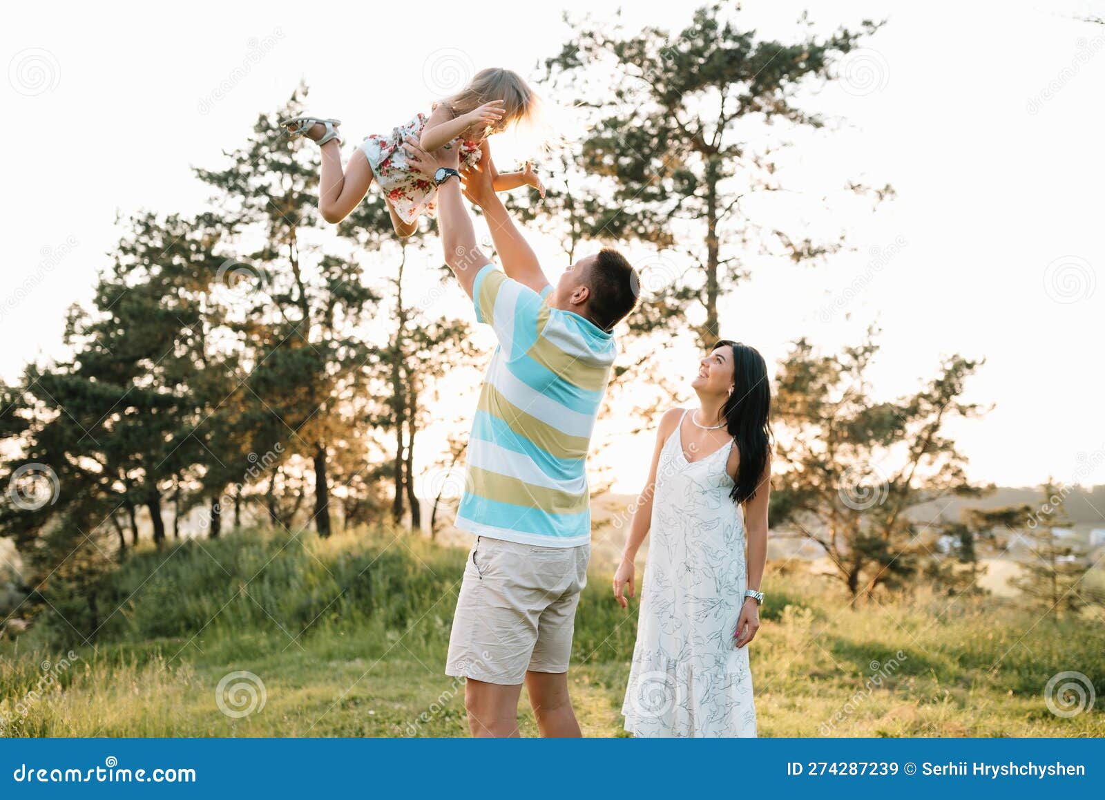 Happy Family of Three Persons Walking the Grass in the Park Stock Image ...